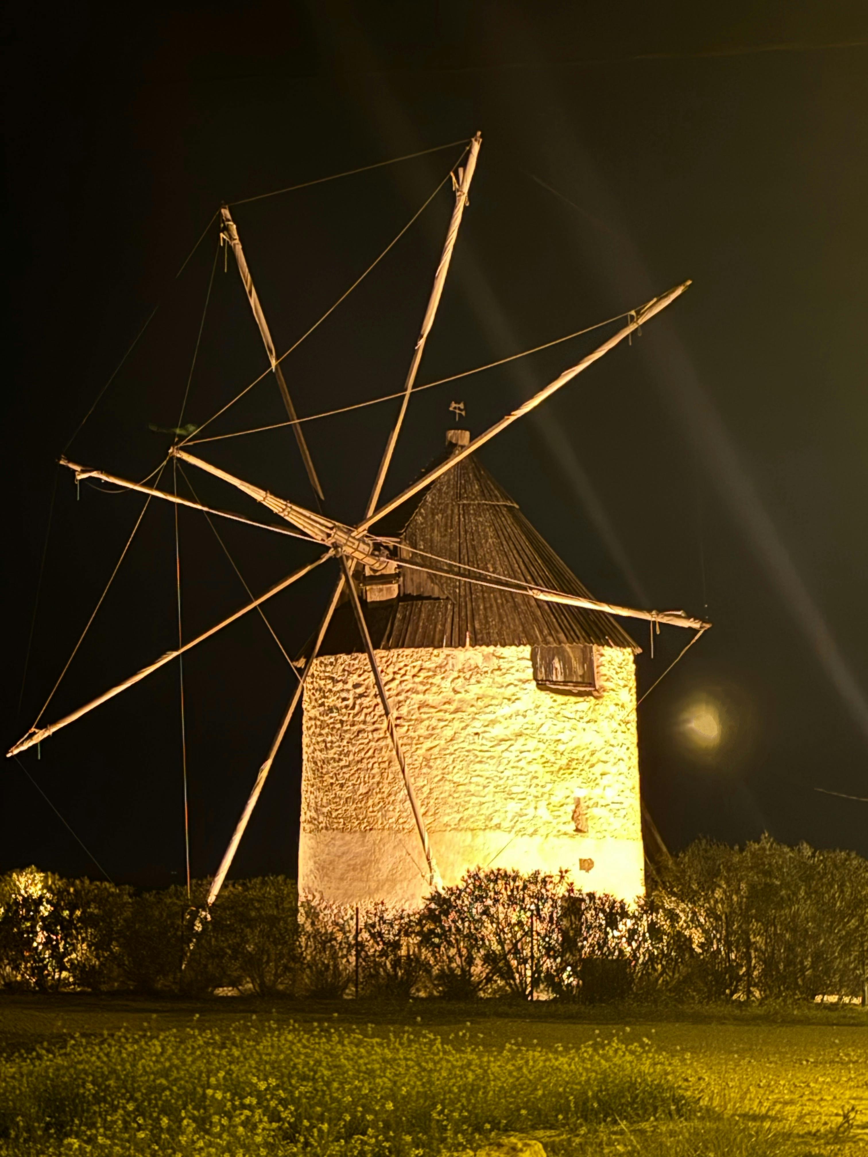 Historic Windmill Illuminated at Night · Free Stock Photo
