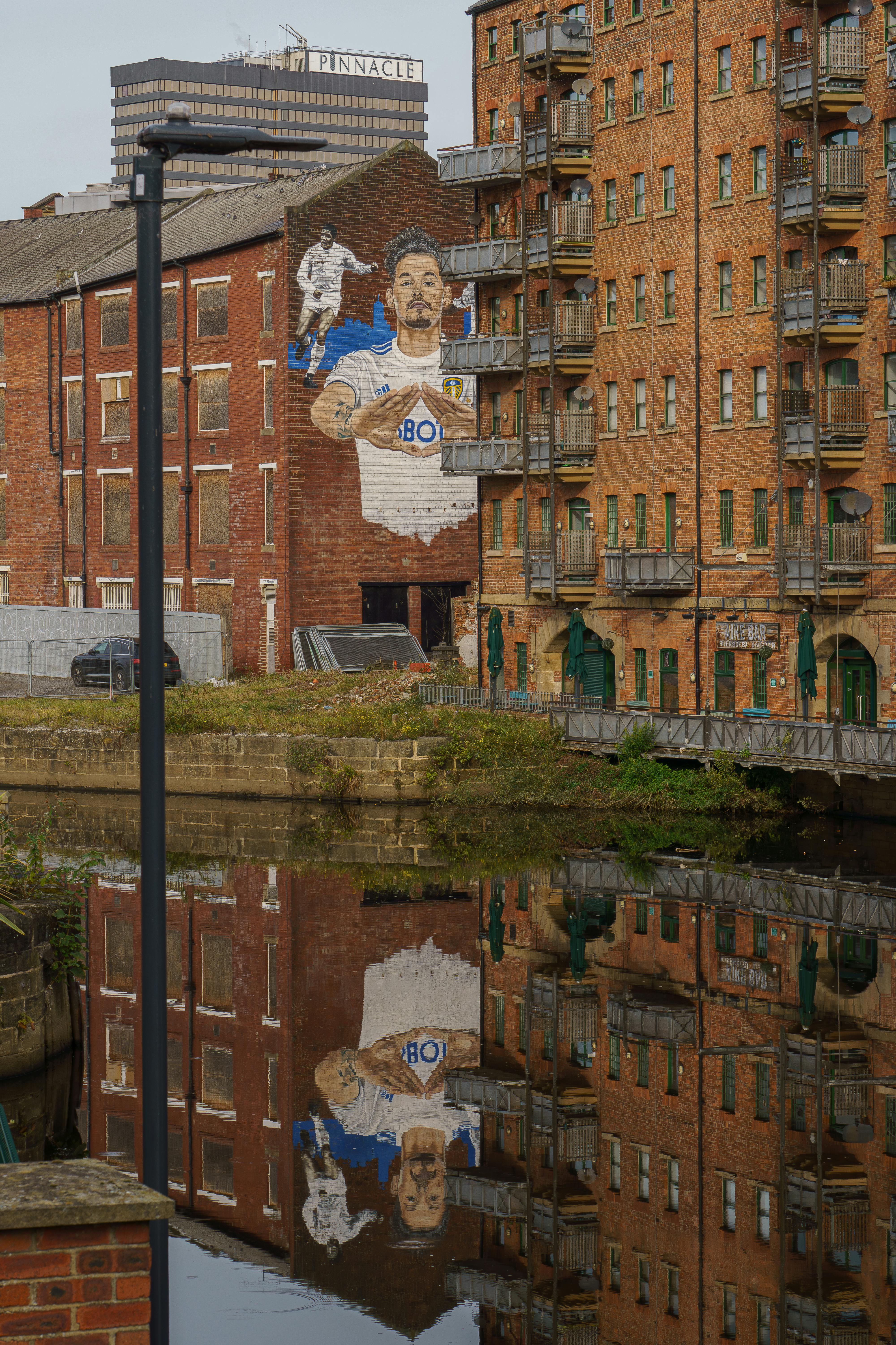 Leeds Canal Reflection with Iconic Street Art · Free Stock Photo