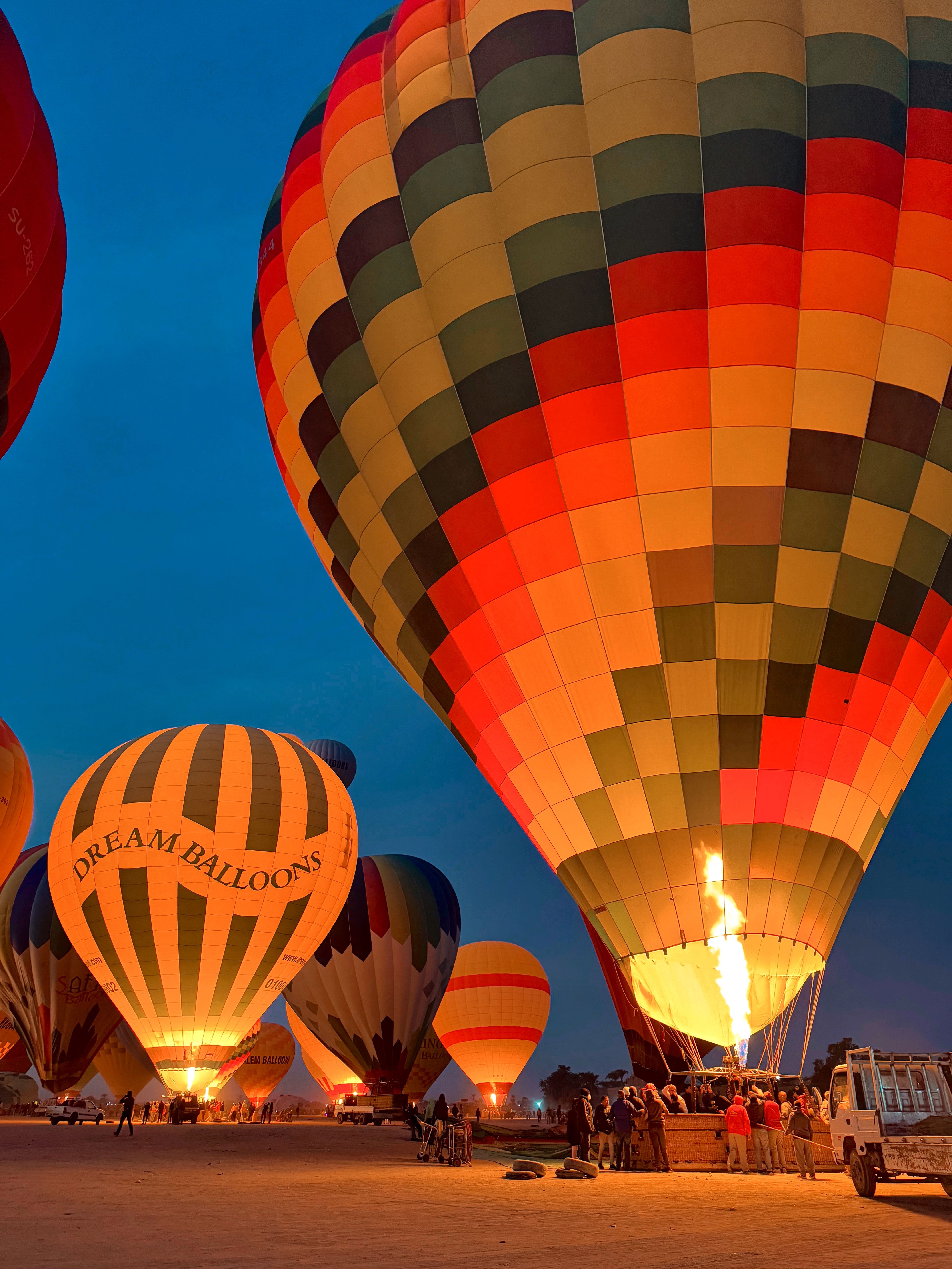 Vibrant Hot Air Balloons at Dawn in Luxor · Free Stock Photo