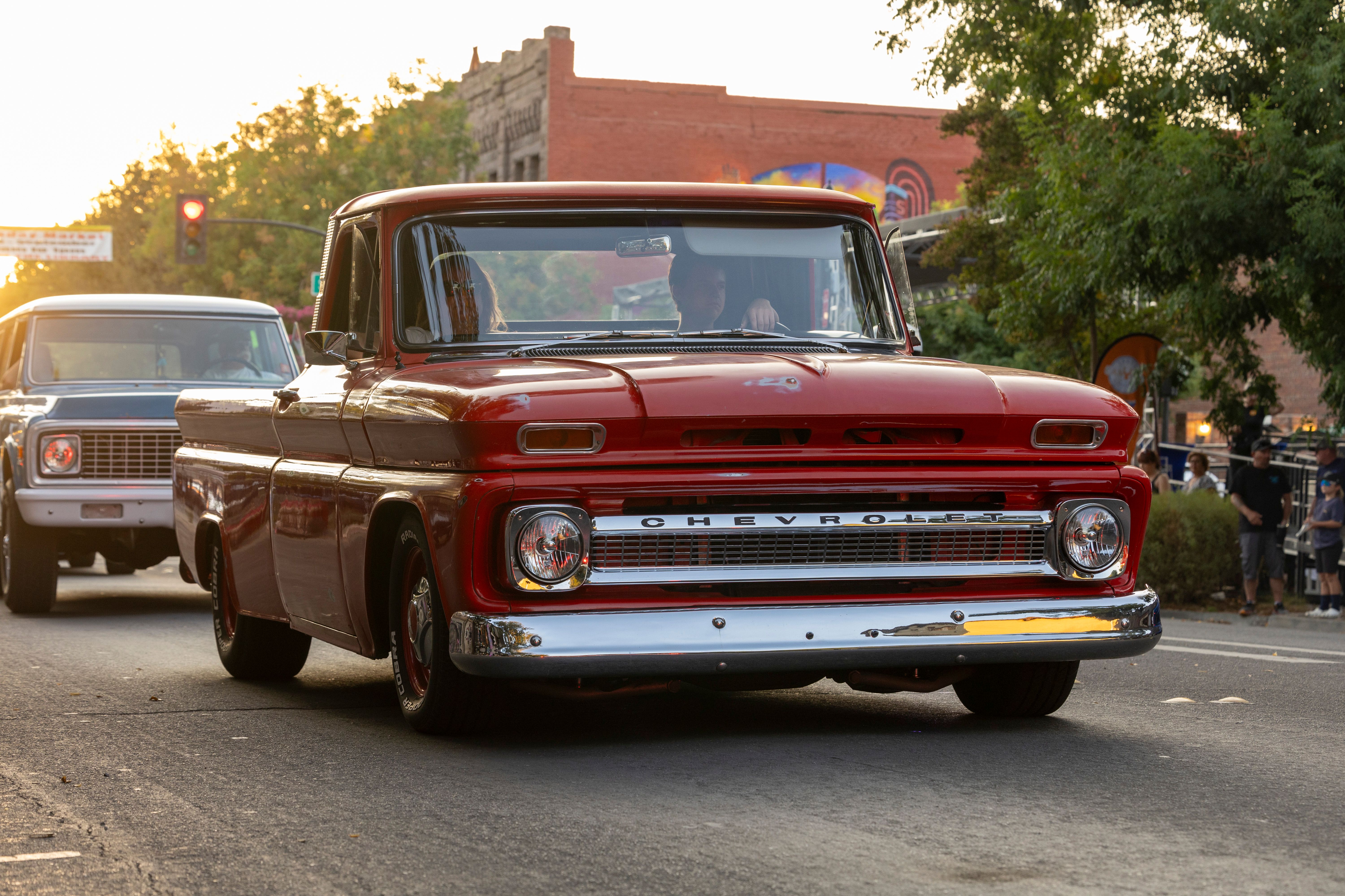 Vintage Red Chevrolet Truck at City Parade · Free Stock Photo