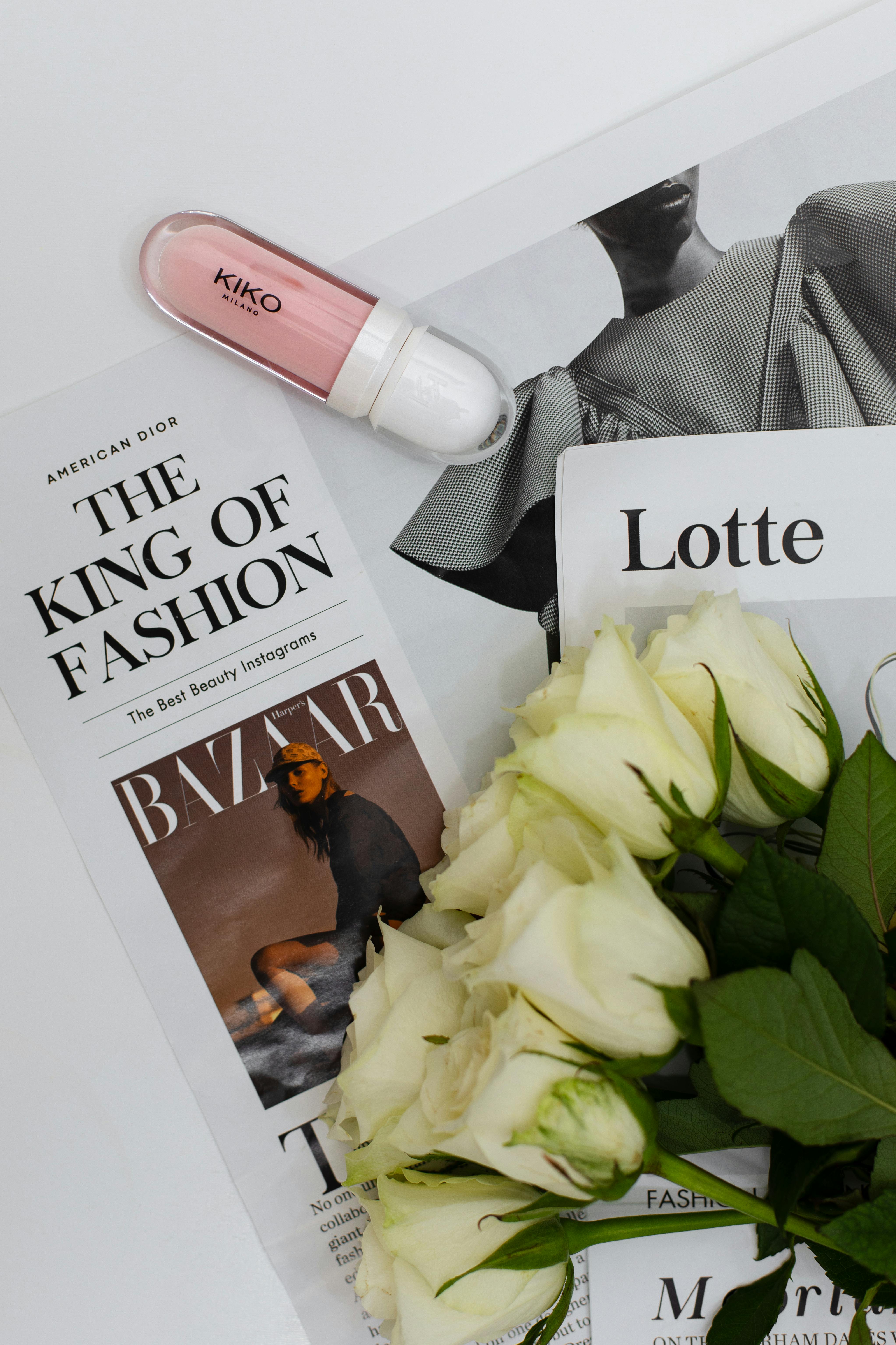 Stylish Fashion Layout with White Roses and Magazines · Free Stock Photo