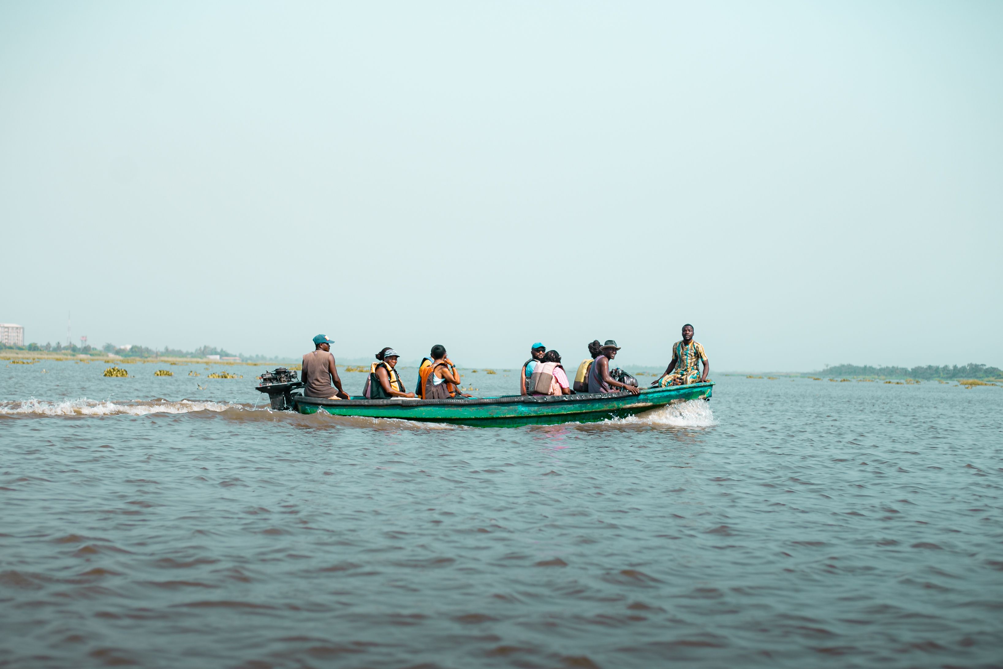 People Traveling by Boat on Lagos Lagoon · Free Stock Photo