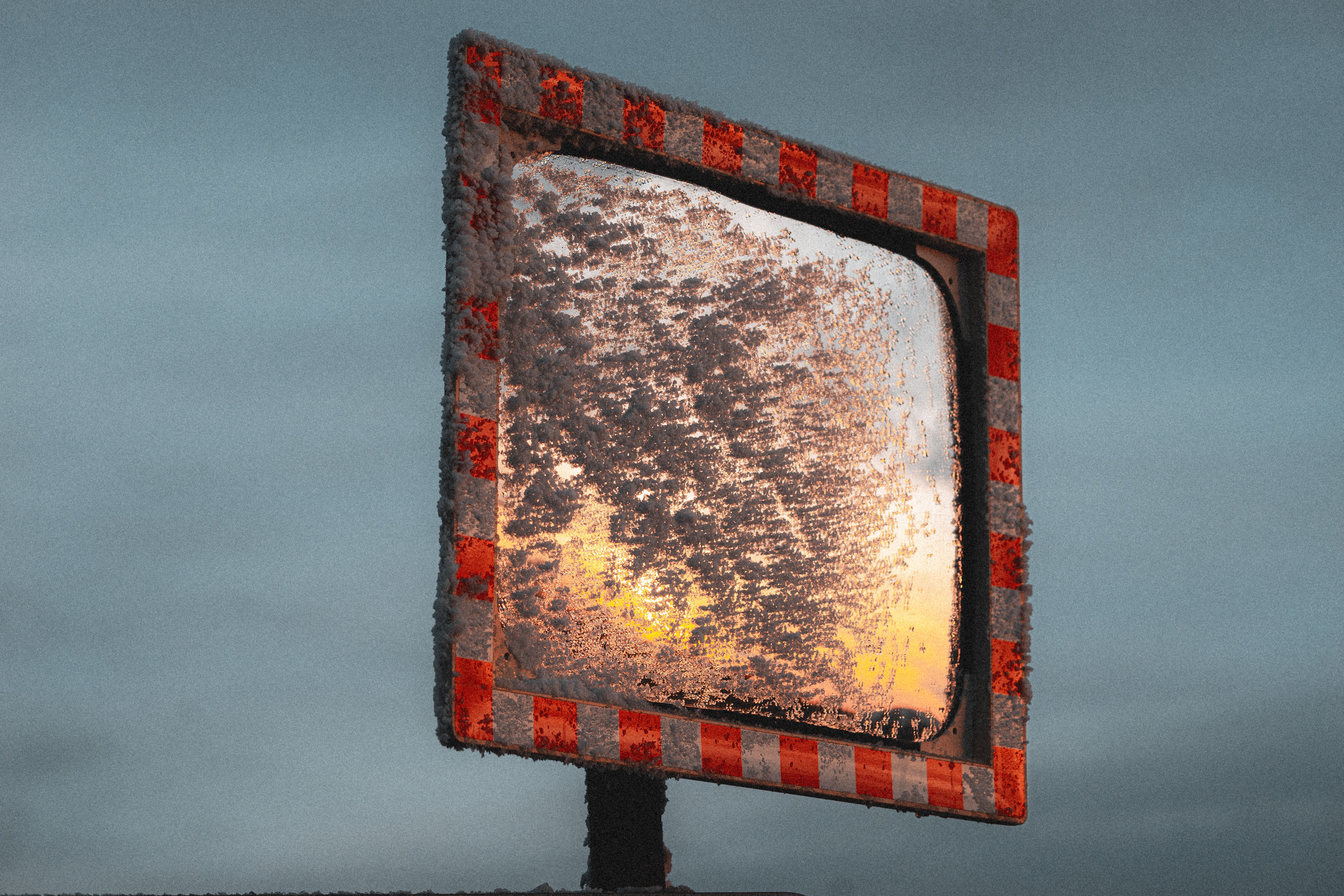 Frozen Traffic Mirror at Dusk · Free Stock Photo