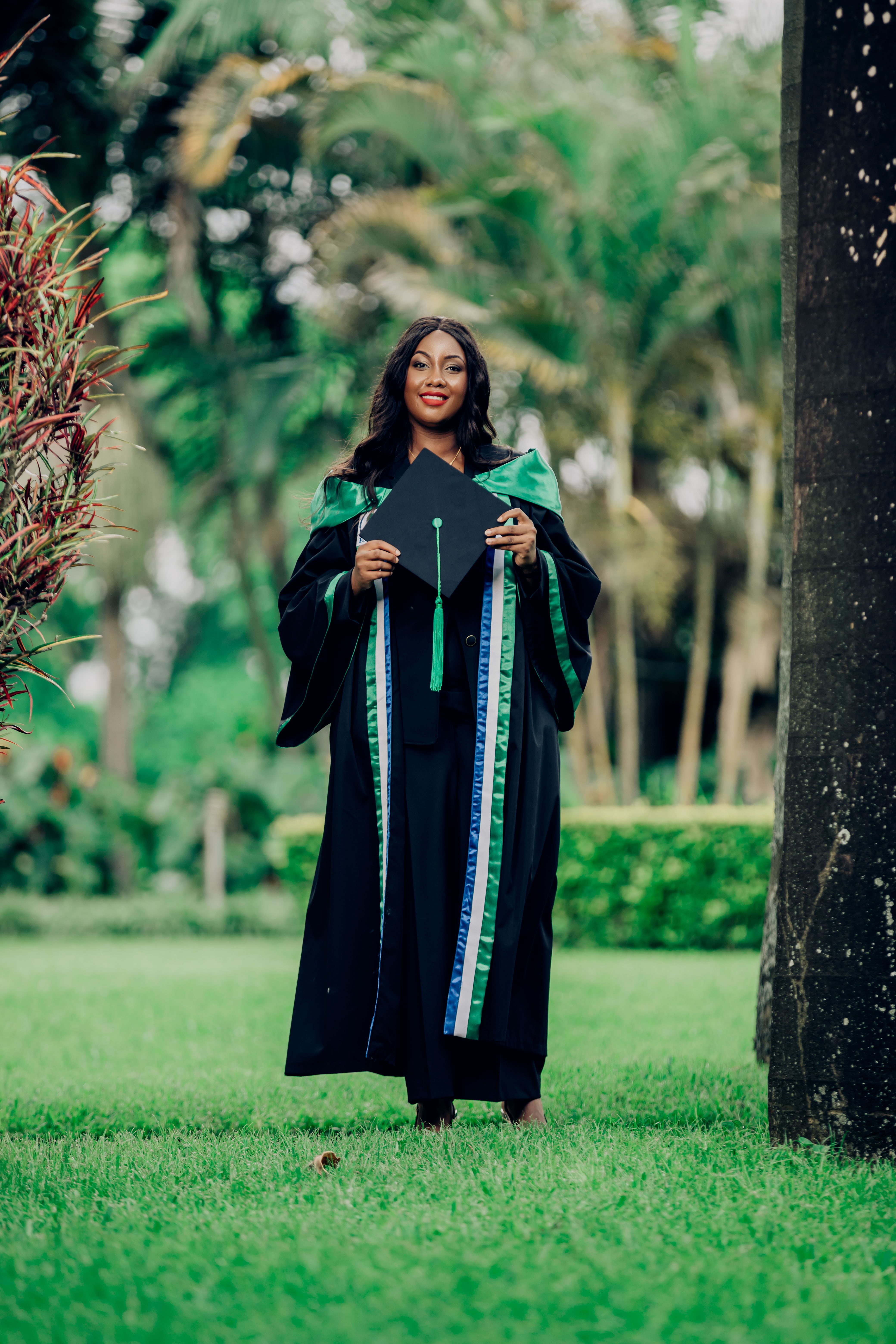 Graduation Portrait in Vibrant Outdoor Setting · Free Stock Photo