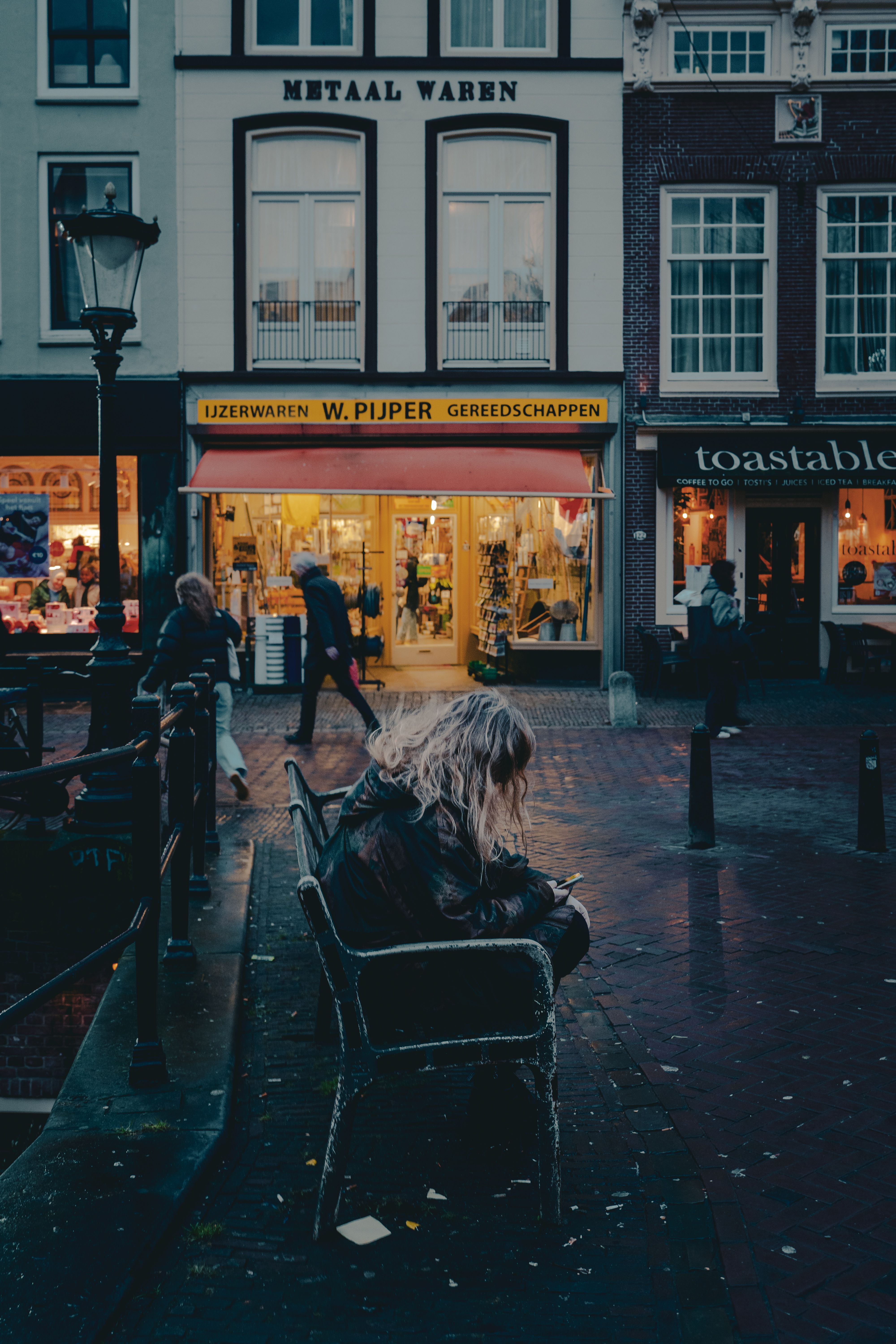 Evening Street Scene with Vintage Storefronts · Free Stock Photo