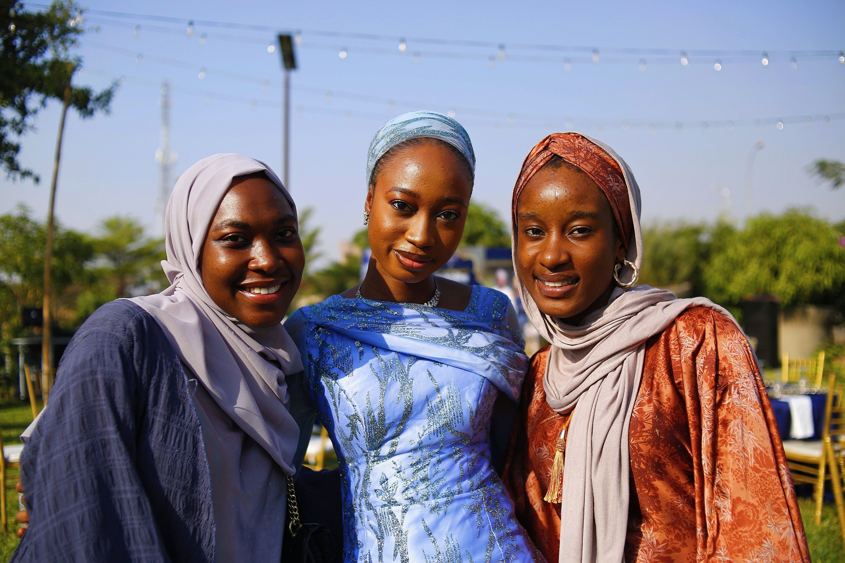 Three Women in Traditional Nigerian Hijab Outdoors · Free Stock Photo