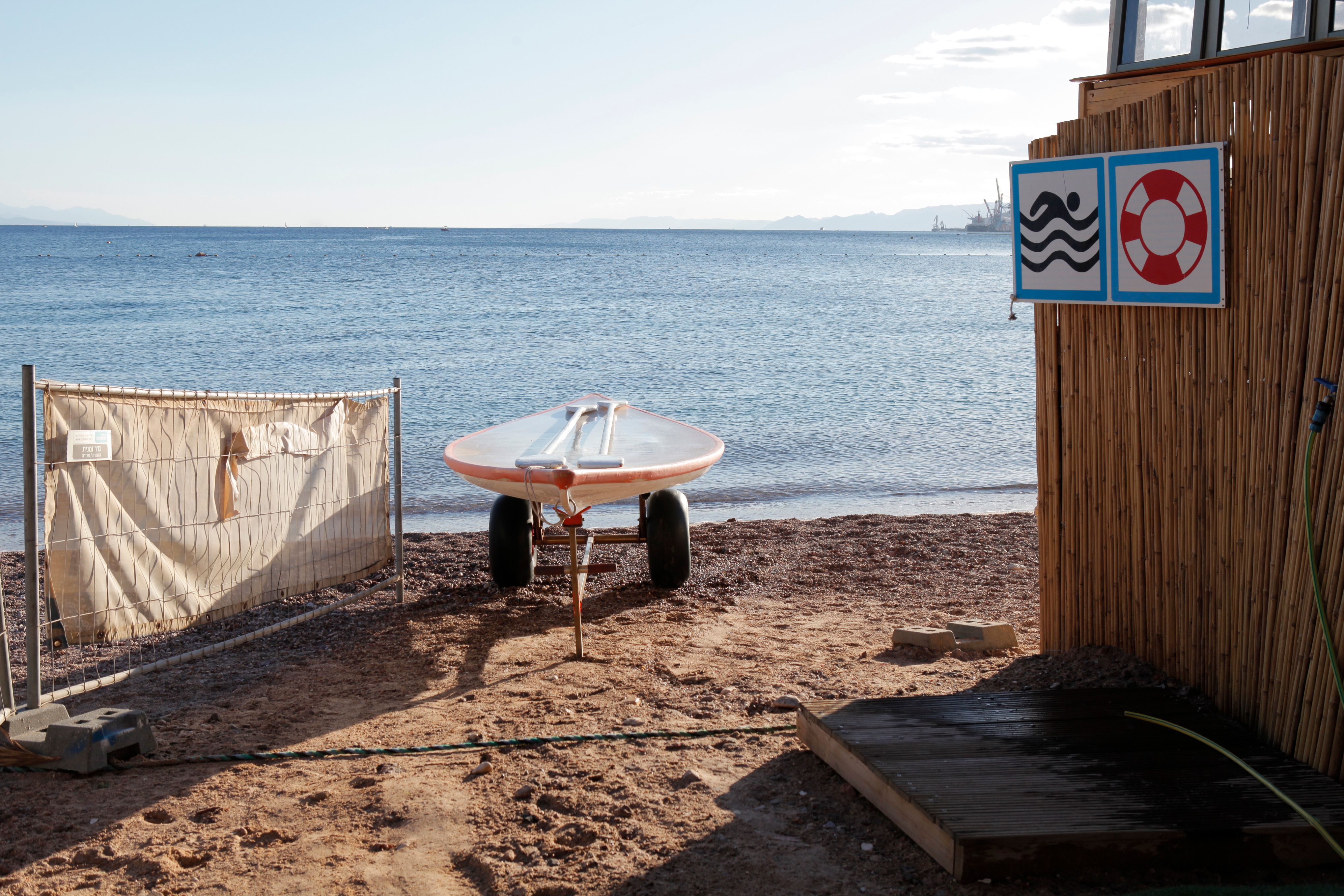 Sunny Beachfront with Lifeguard Equipment in Eilat · Free Stock Photo