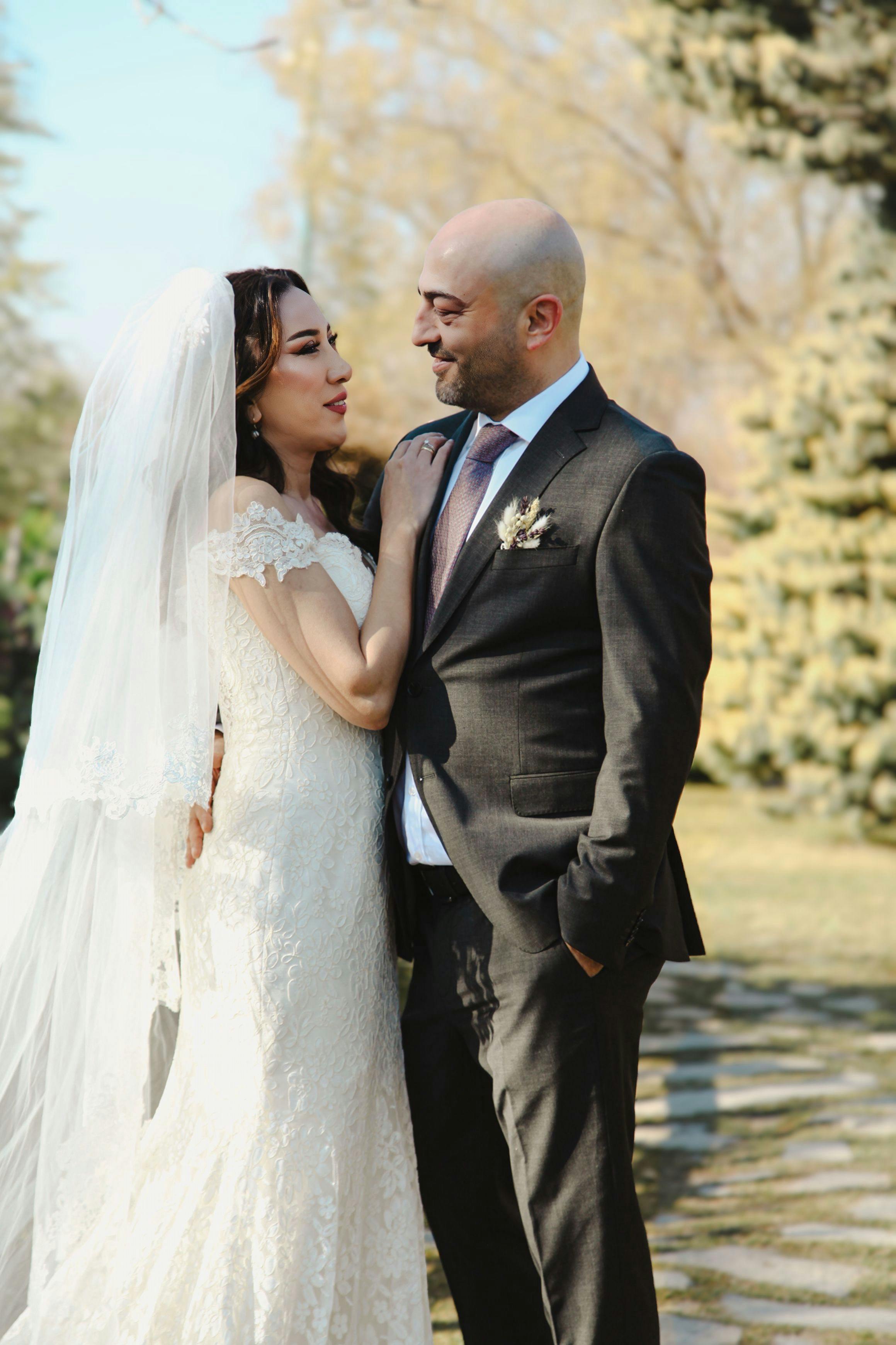 Elegant Outdoor Wedding Portrait of Happy Couple · Free Stock Photo