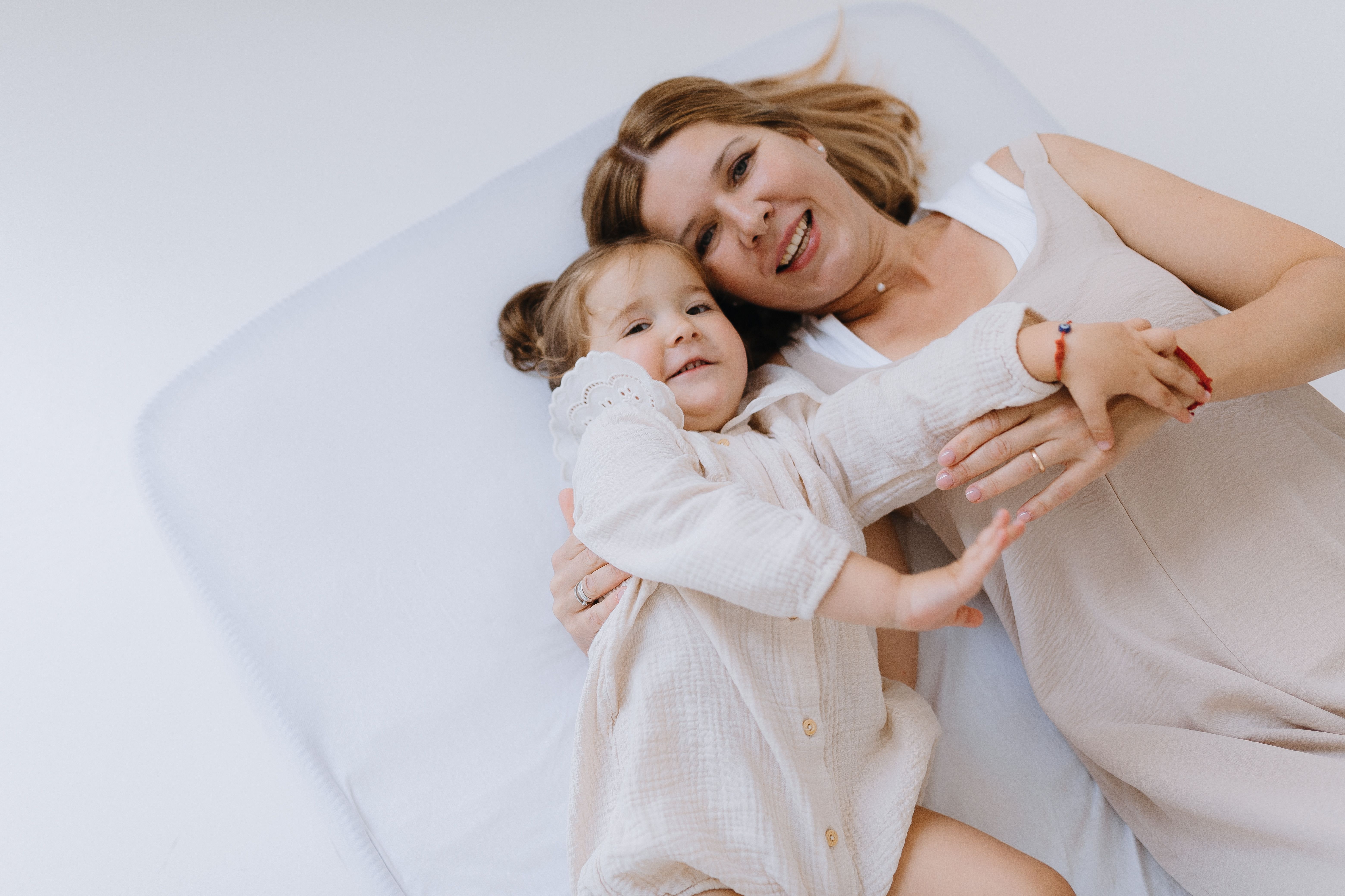 Mother and Child Bonding in Soft Pastel Colors · Free Stock Photo