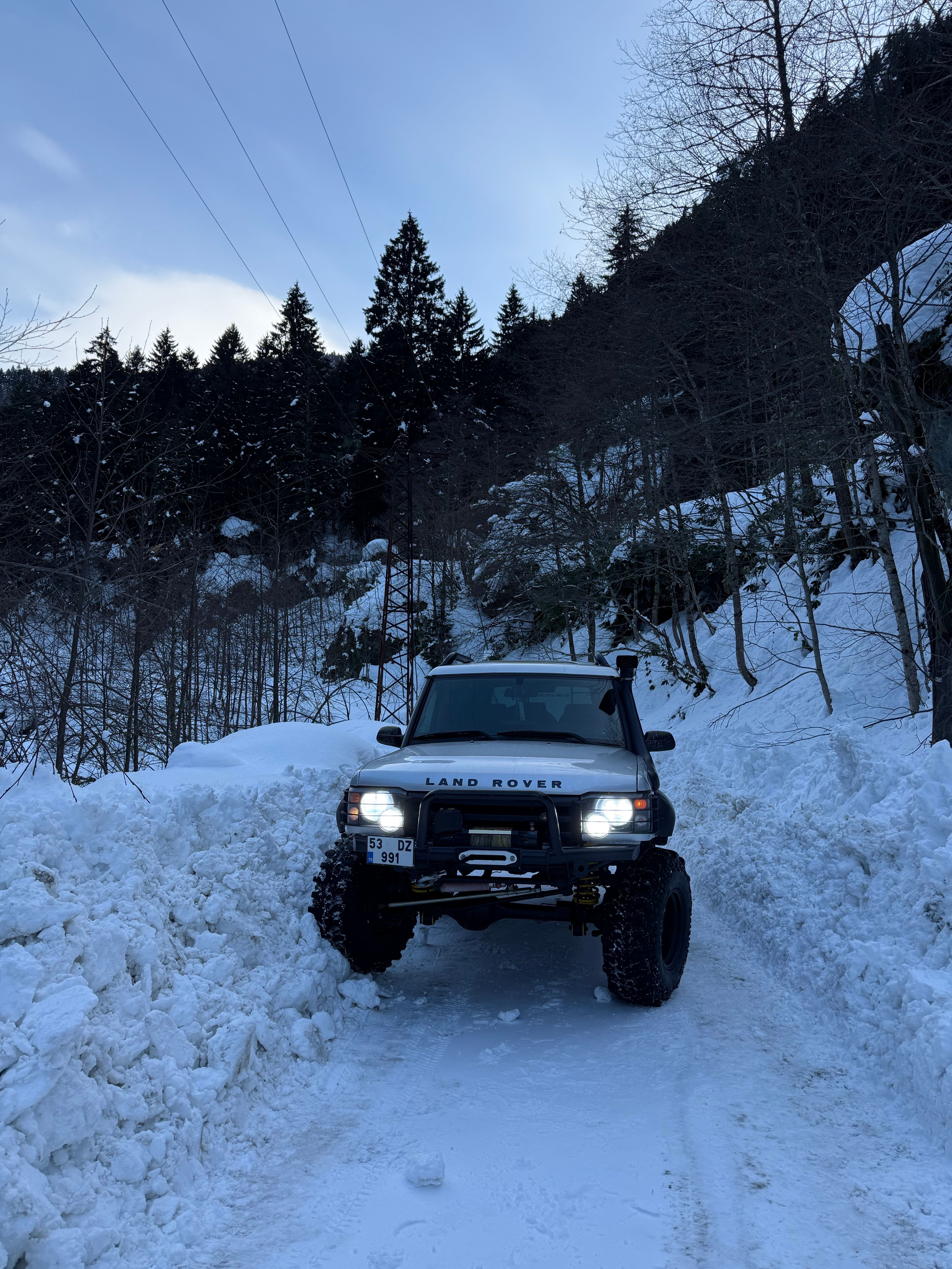4x4 Off-Road Adventure in Snowy Forest · Free Stock Photo