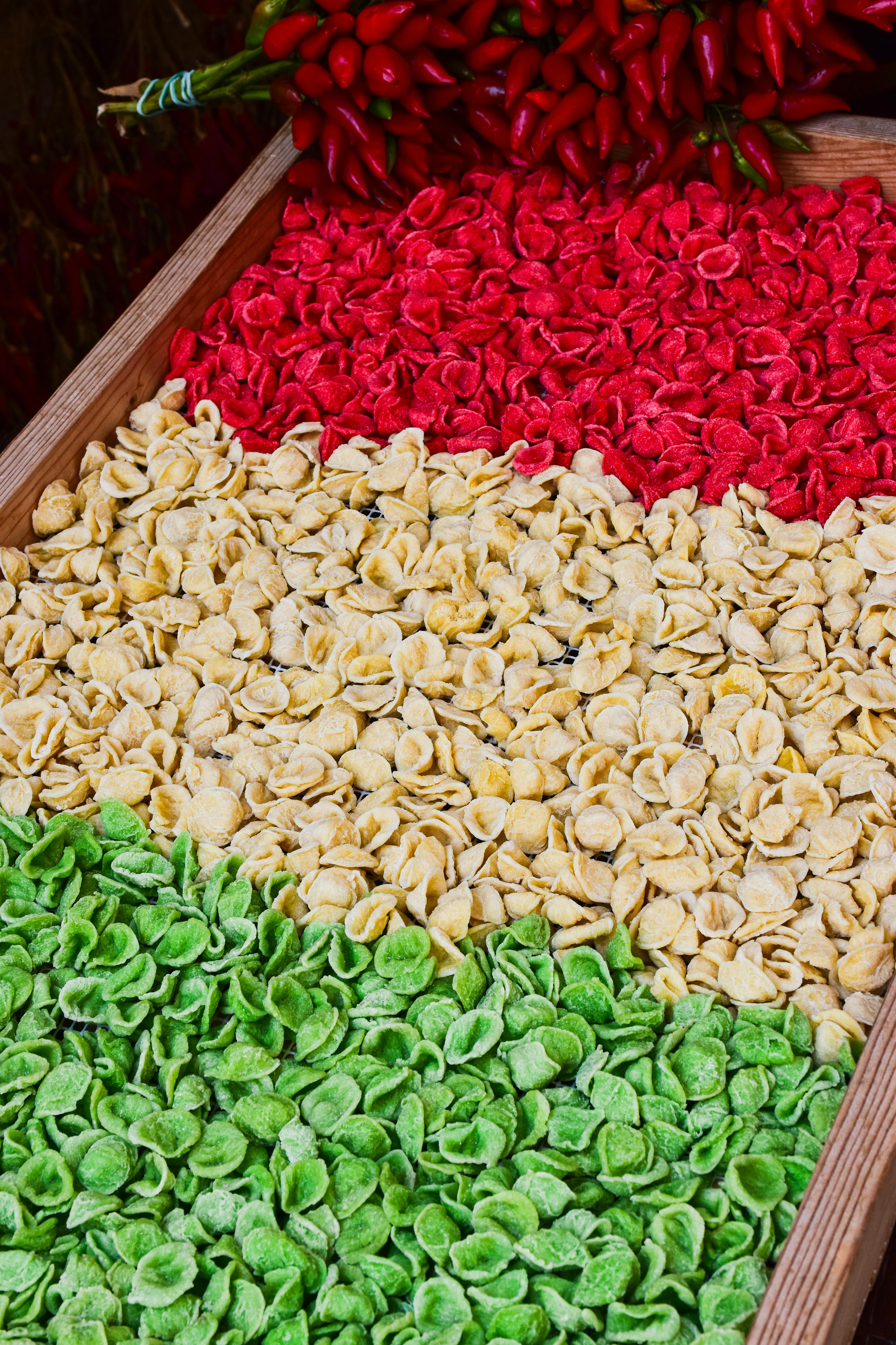 Colorful Italian Orecchiette Pasta Display · Free Stock Photo