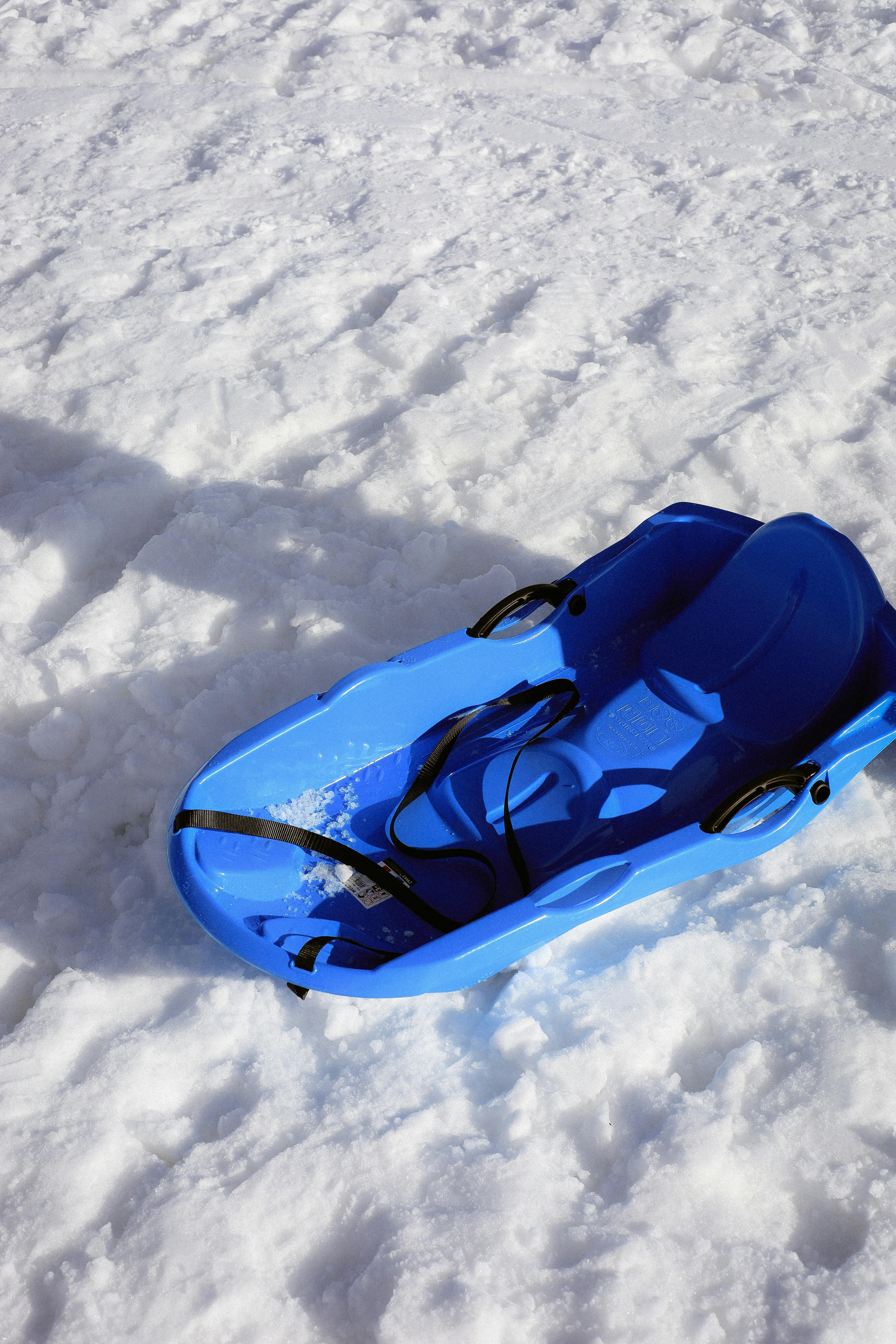 Bright Blue Sled on a Snowy Winter Day · Free Stock Photo