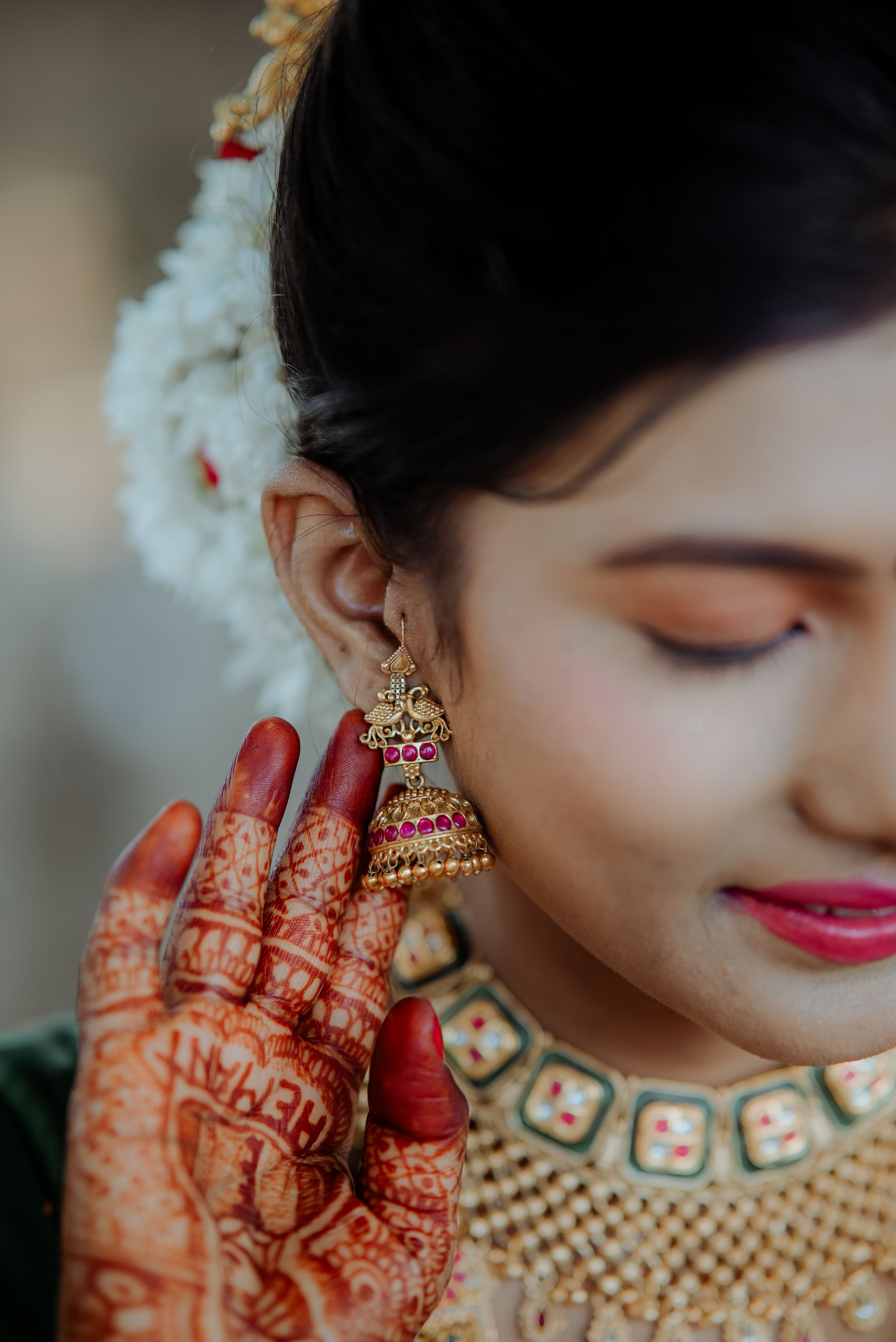 Close-up of Woman with Traditional Henna and Jewelry · Free Stock Photo