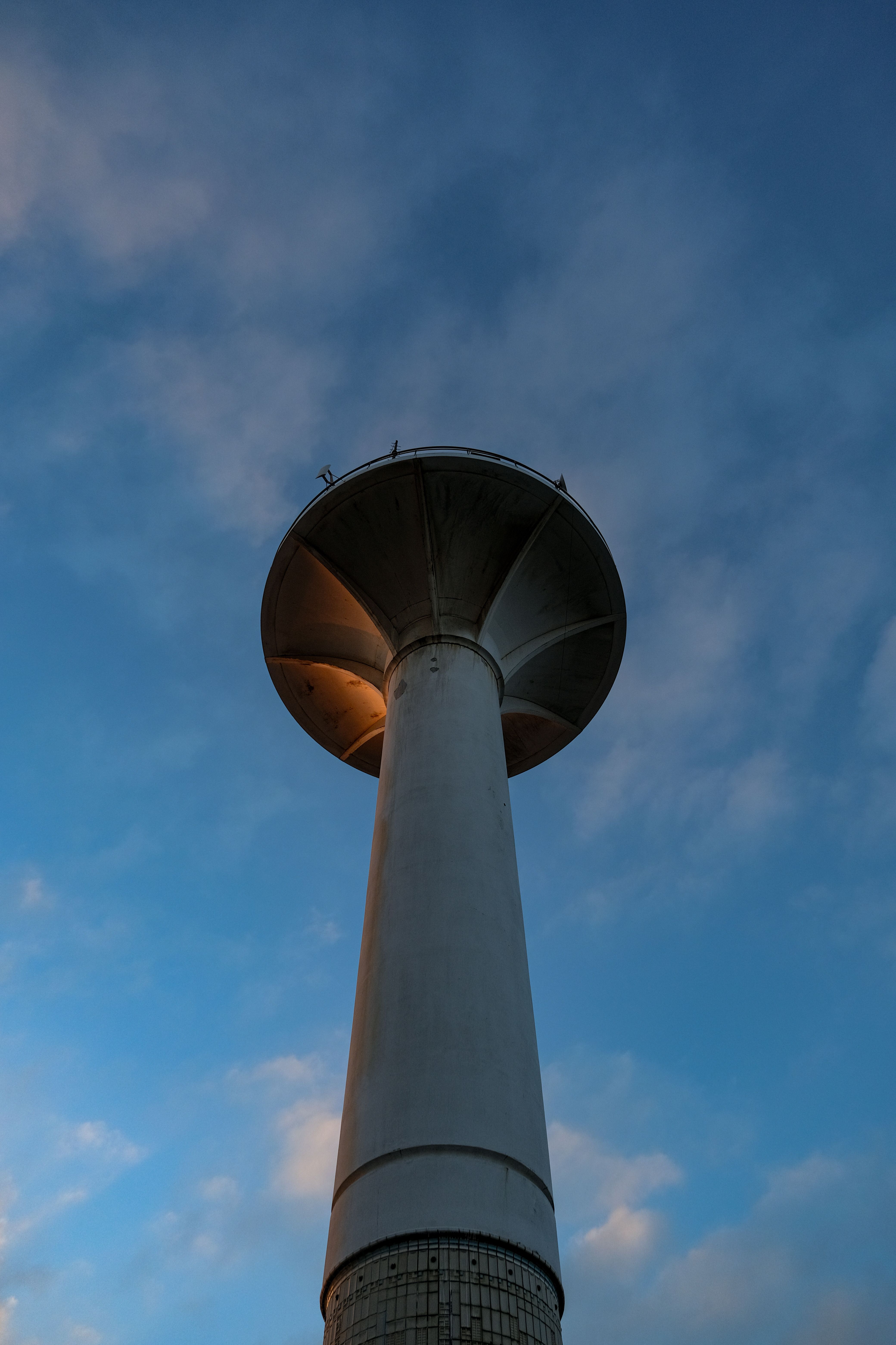 Dramatic Water Tower Against Evening Sky · Free Stock Photo