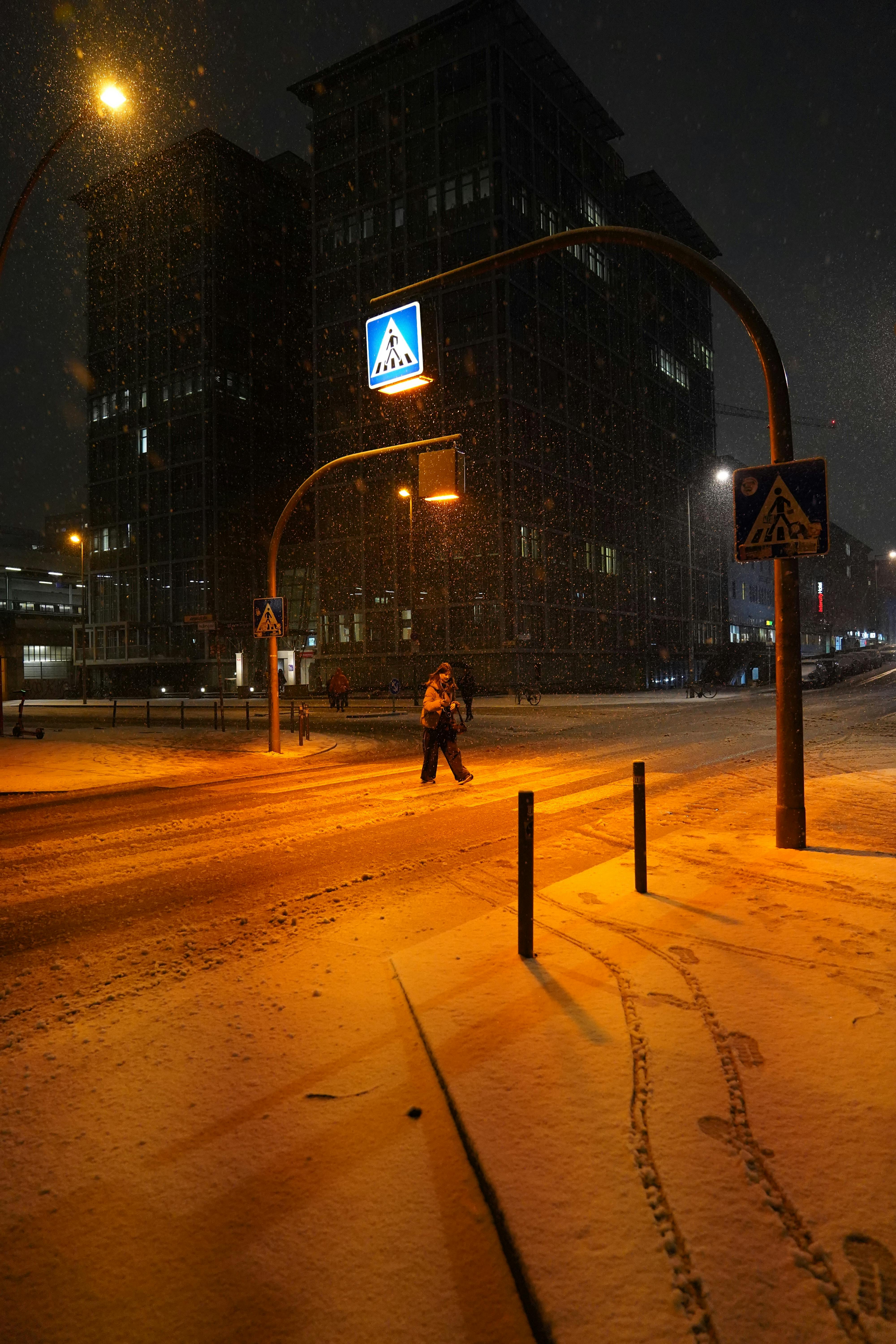 Nighttime Snowy Street Scene in Berlin · Free Stock Photo