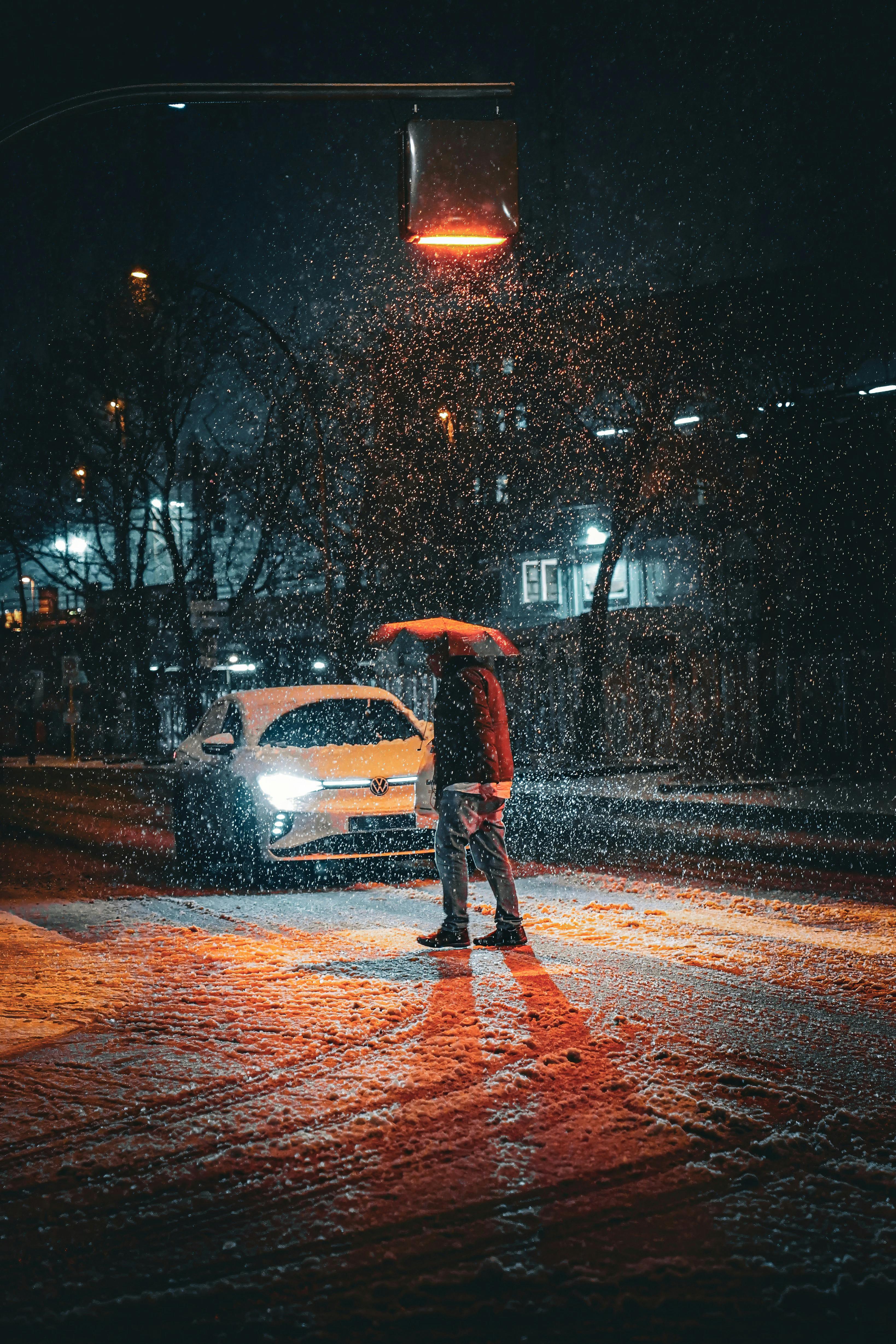 Winter Night Street Scene with Falling Snow in Berlin · Free Stock Photo