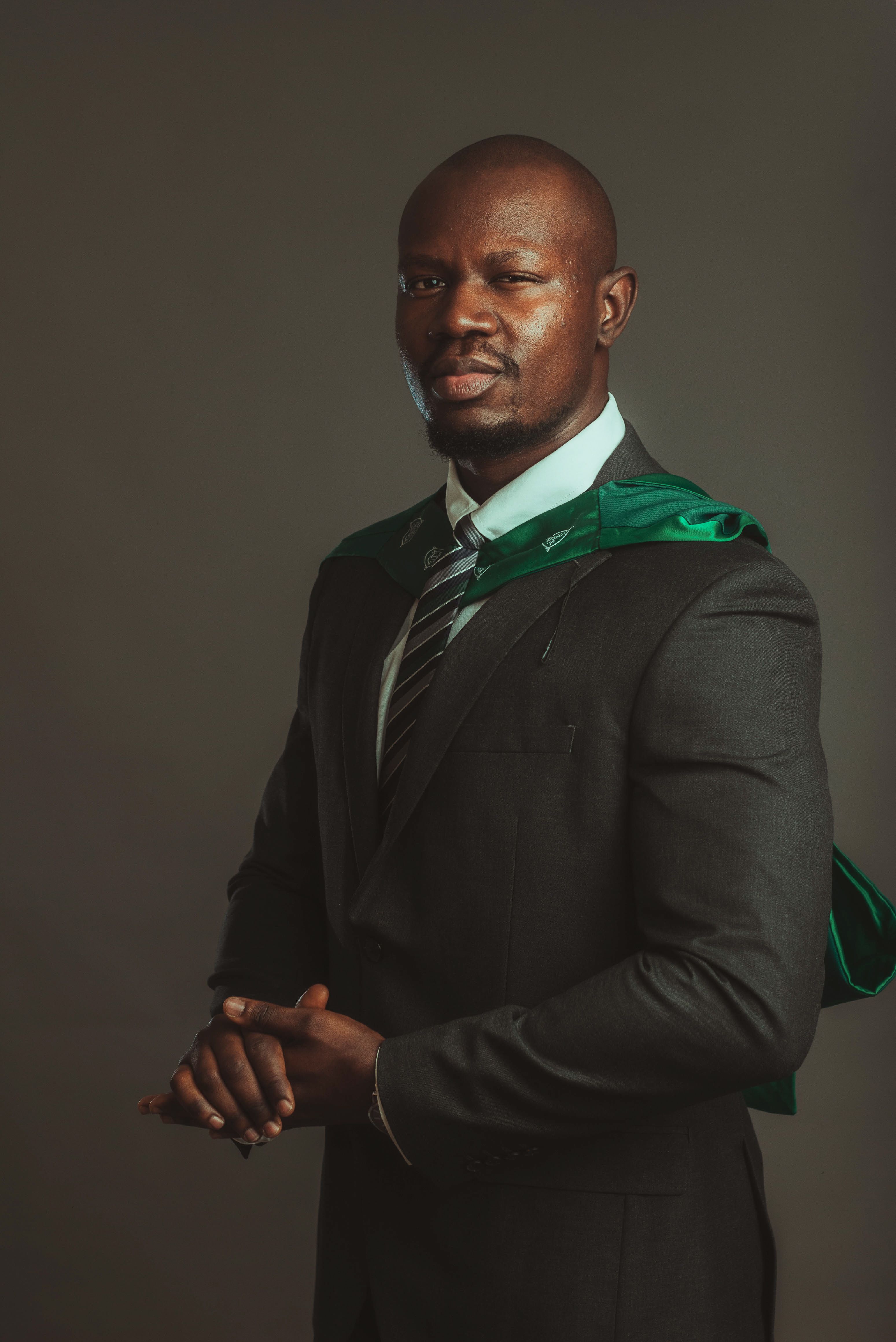 Dignified Portrait of a Graduate in Suit · Free Stock Photo