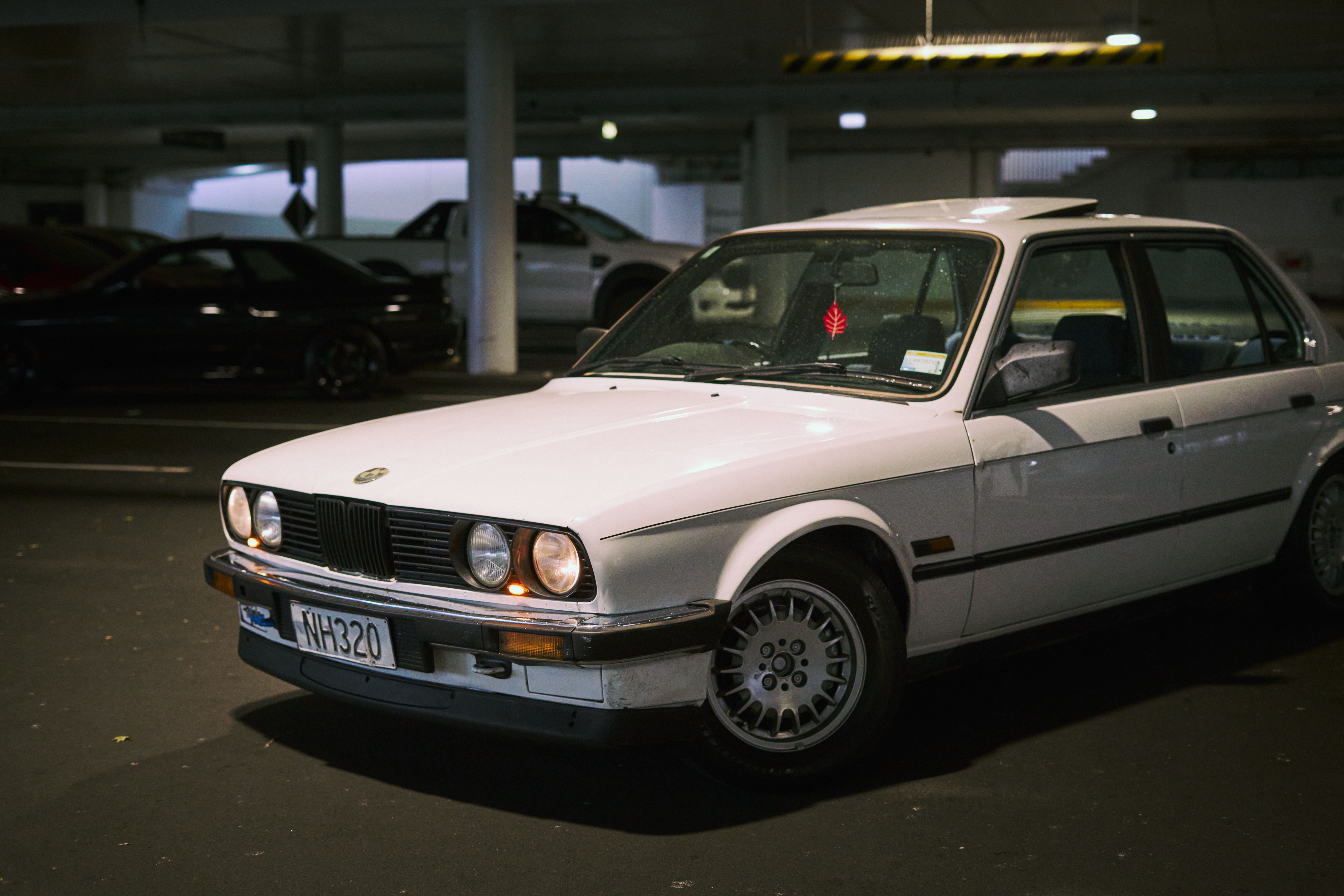 Moody Urban Scene of Modified Car in Auckland Parking Lot · Free Stock ...