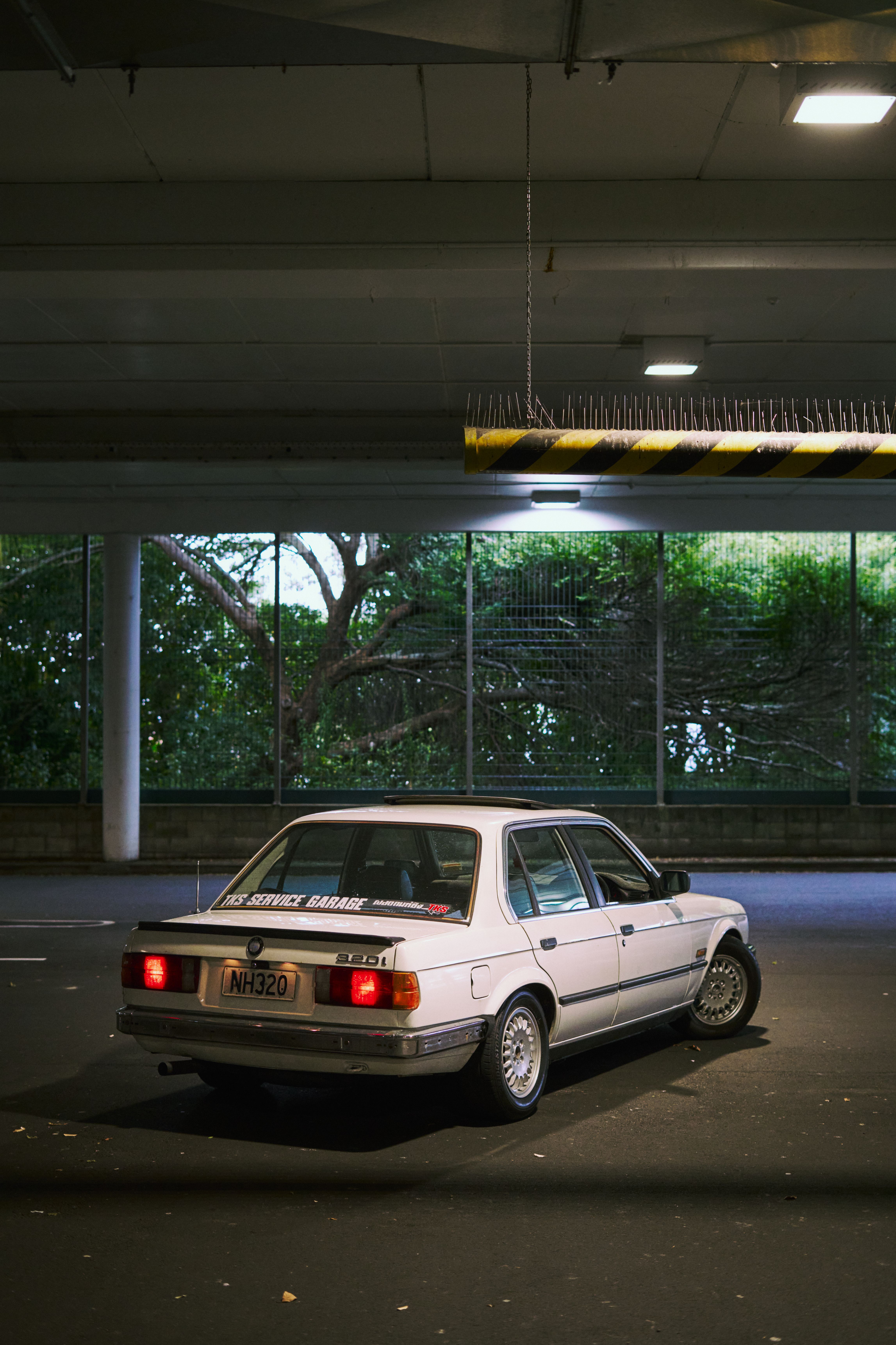 Classic Modified Car in Urban Parking Lot · Free Stock Photo