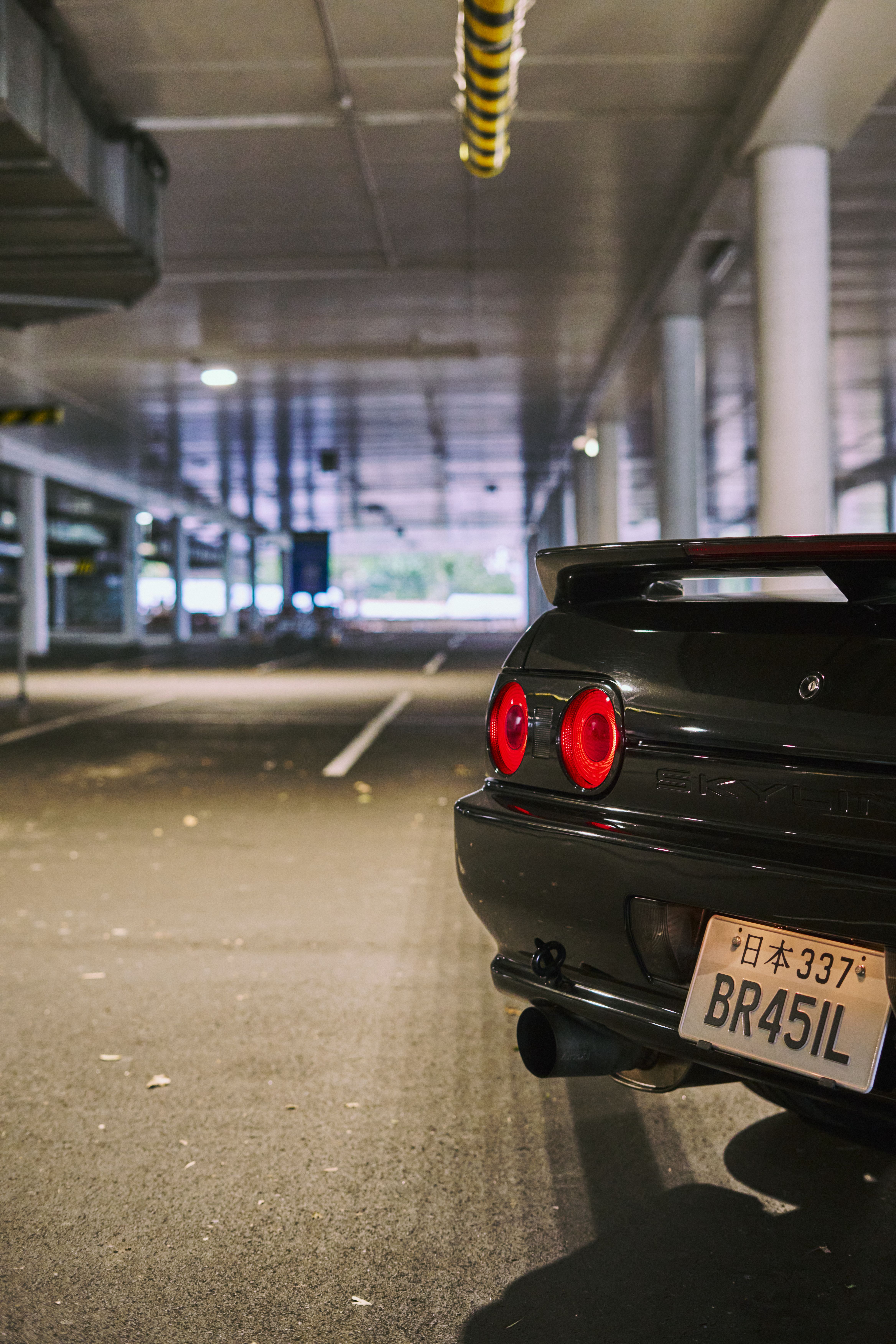 Sleek Modified Car in Urban Parking Lot · Free Stock Photo