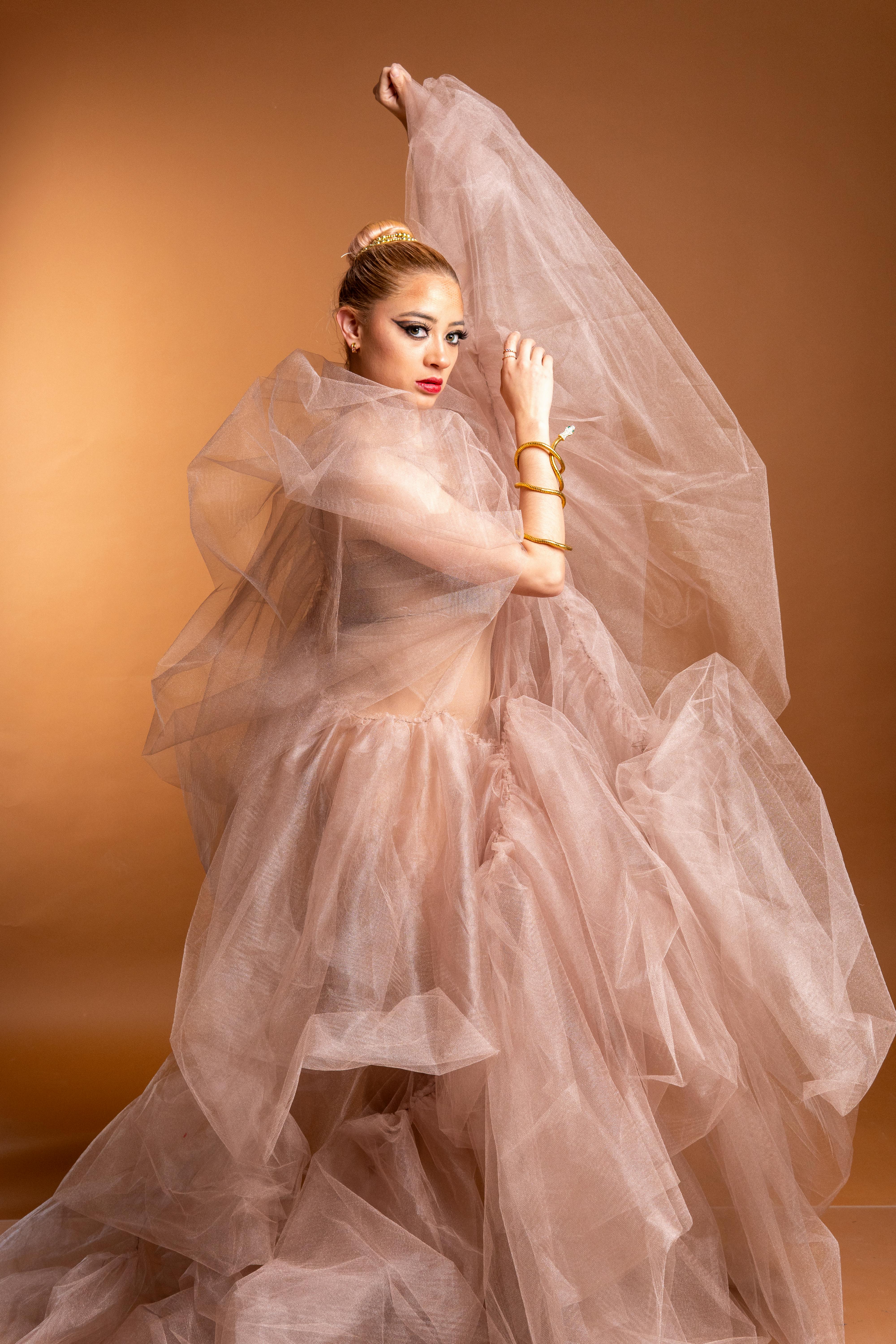 Elegant Artistic Dance Portrait in Soft Mocha Tones · Free Stock Photo