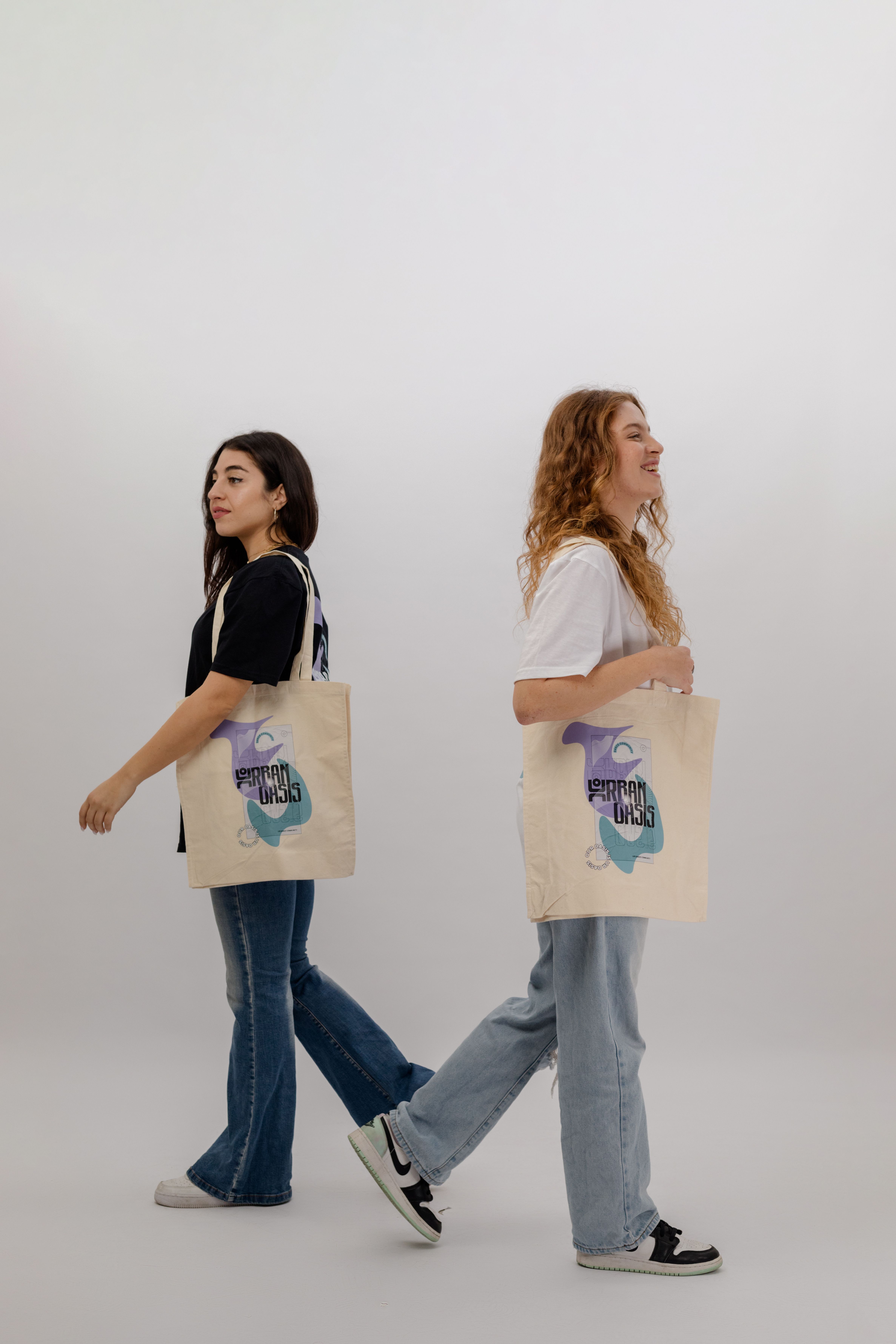 Young Women with Designer Tote Bags Fashion Shoot · Free Stock Photo