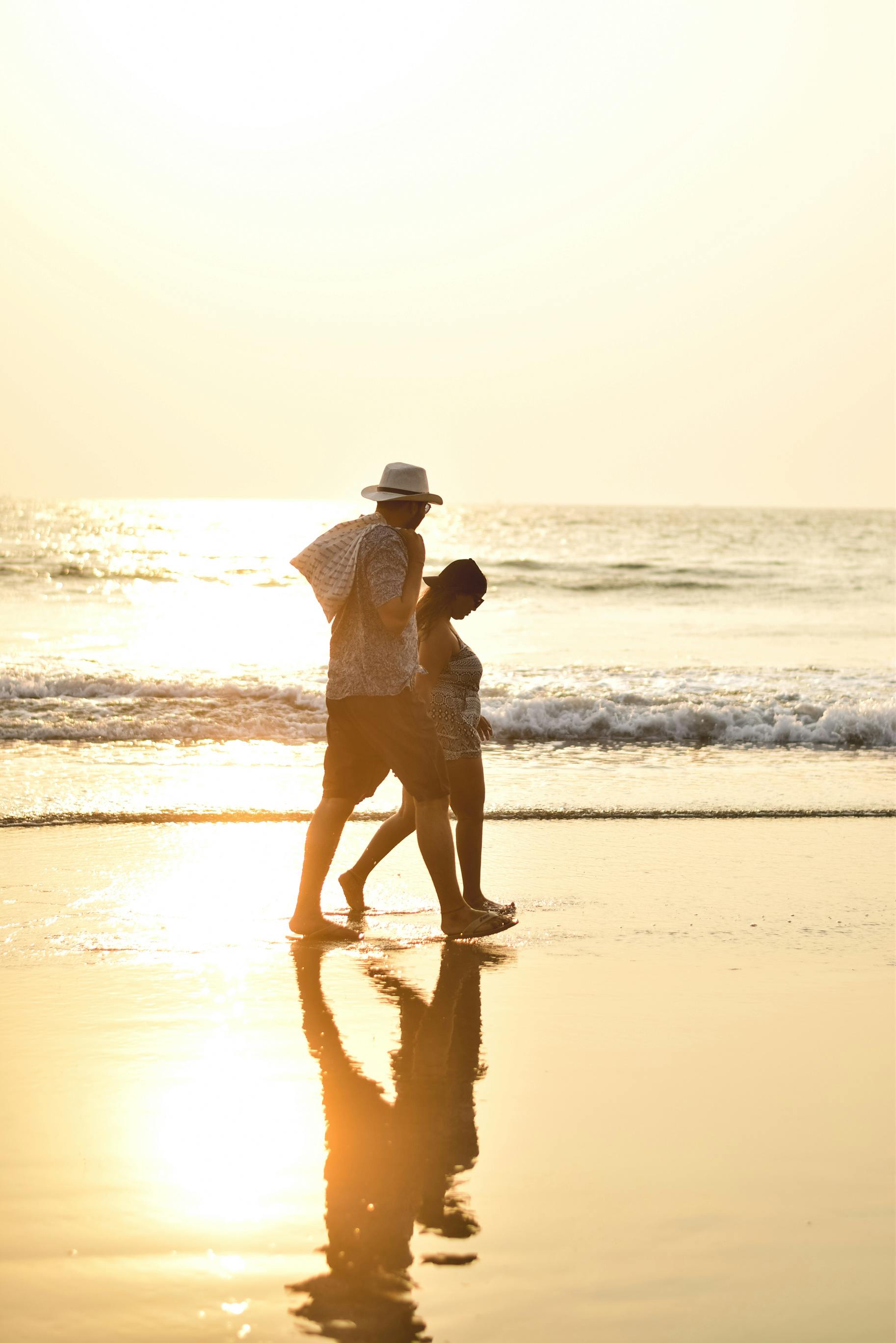 Romantic Beach Walk at Sunset in Goa · Free Stock Photo