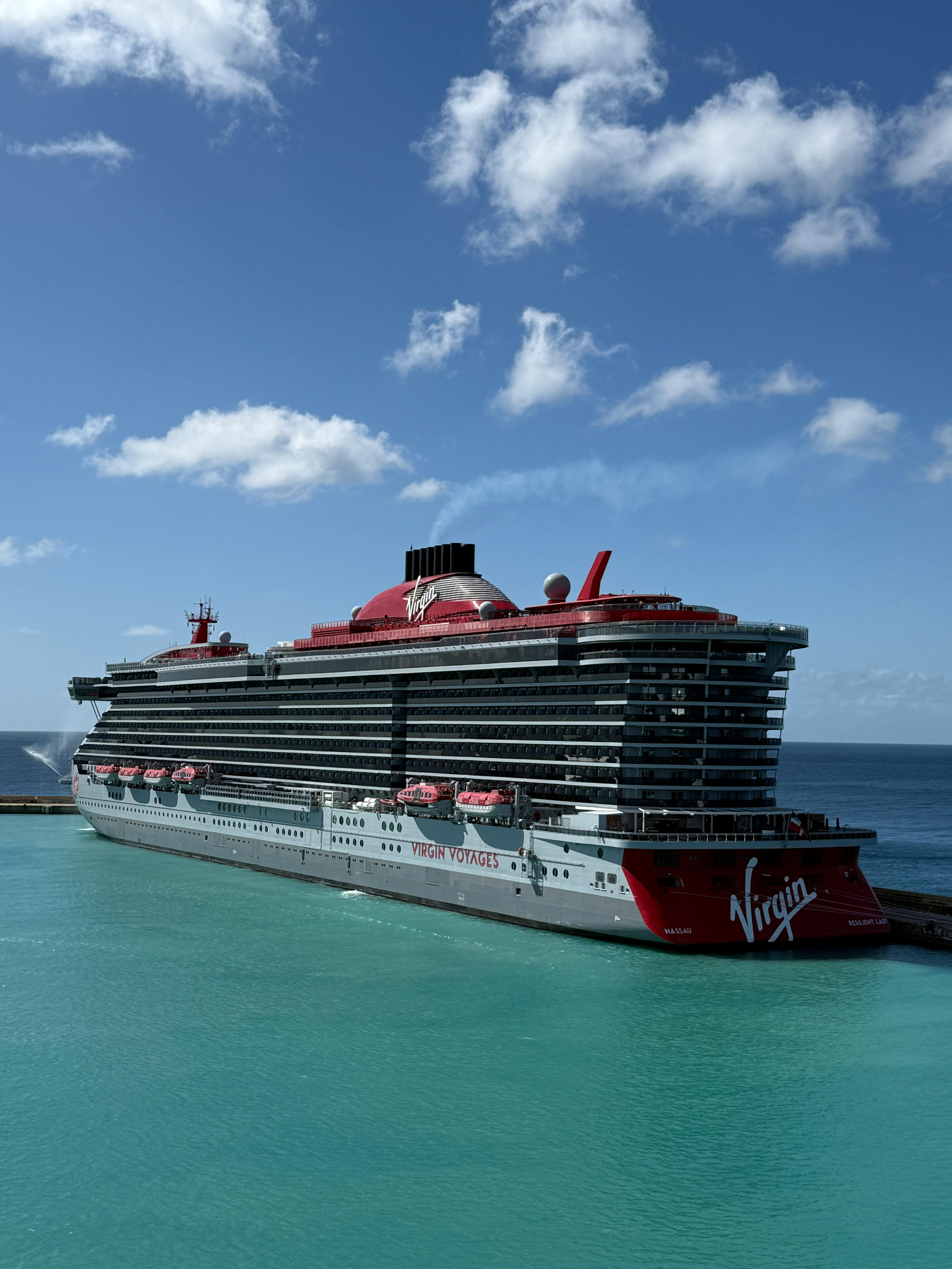 Luxurious Cruise Ship Docked at Scenic Port · Free Stock Photo