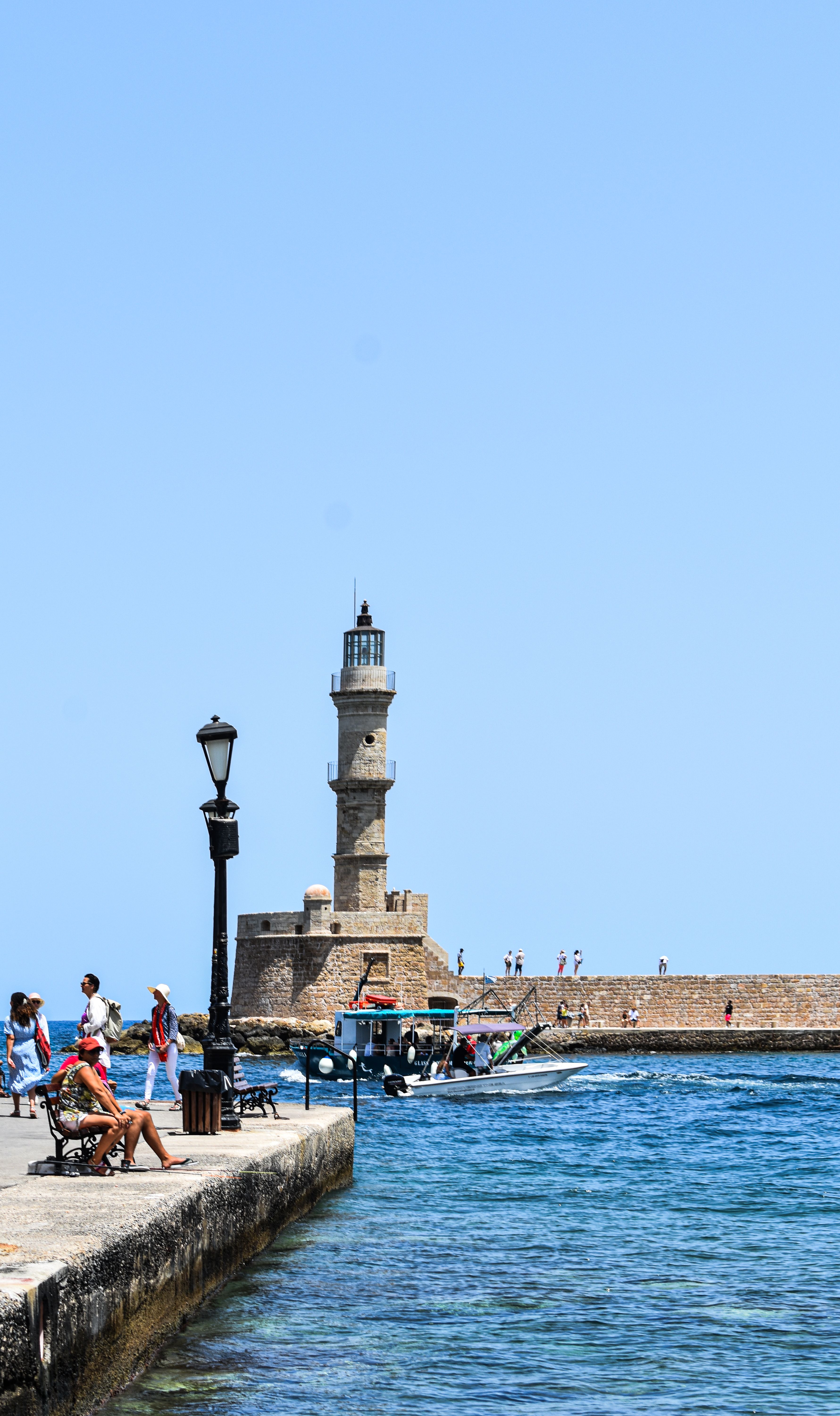 Chania Lighthouse and Harbor on a Sunny Day · Free Stock Photo