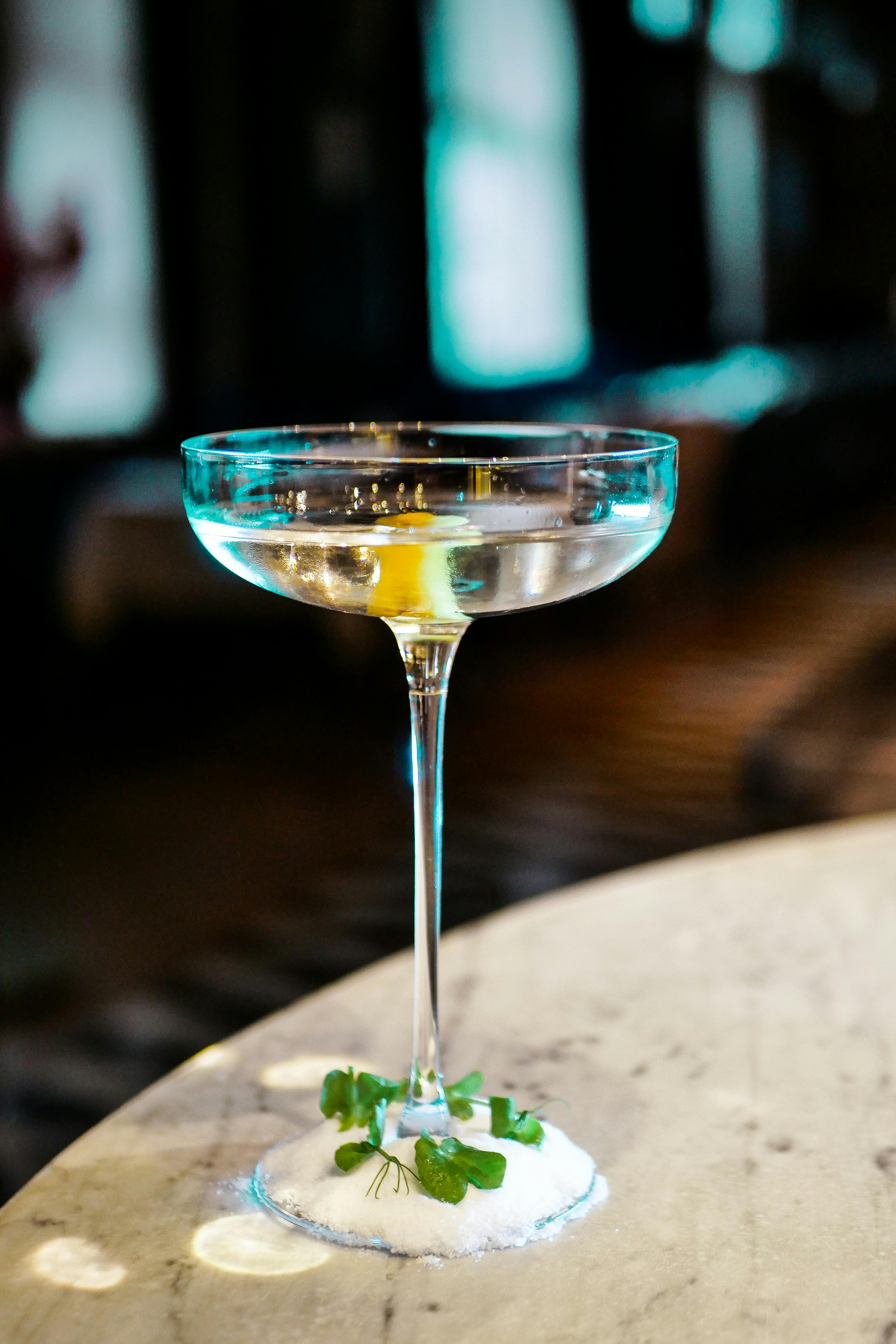 Elegant Cocktail Glass on Marble Table in Bar · Free Stock Photo