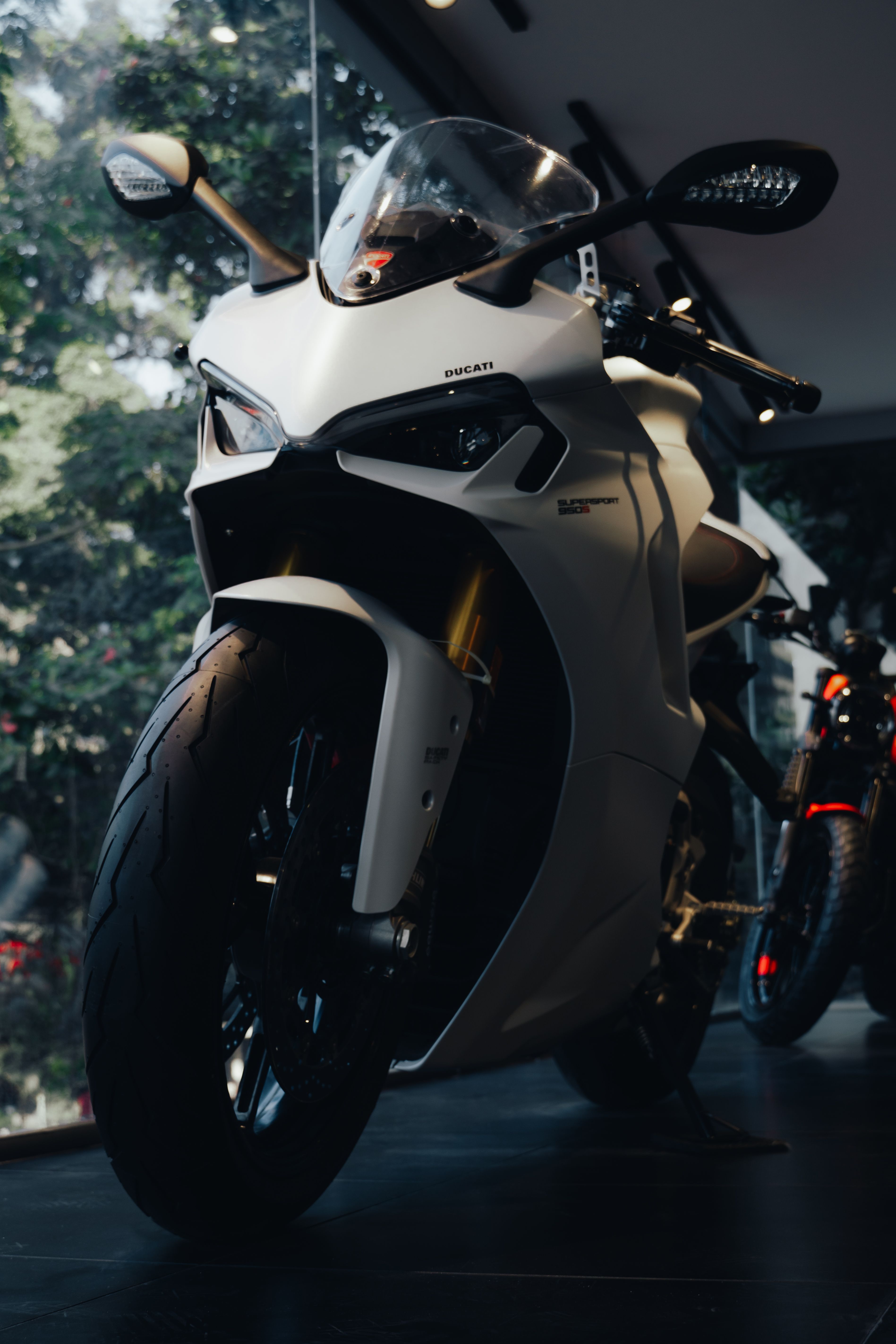 Sleek White Ducati Motorcycle Display · Free Stock Photo