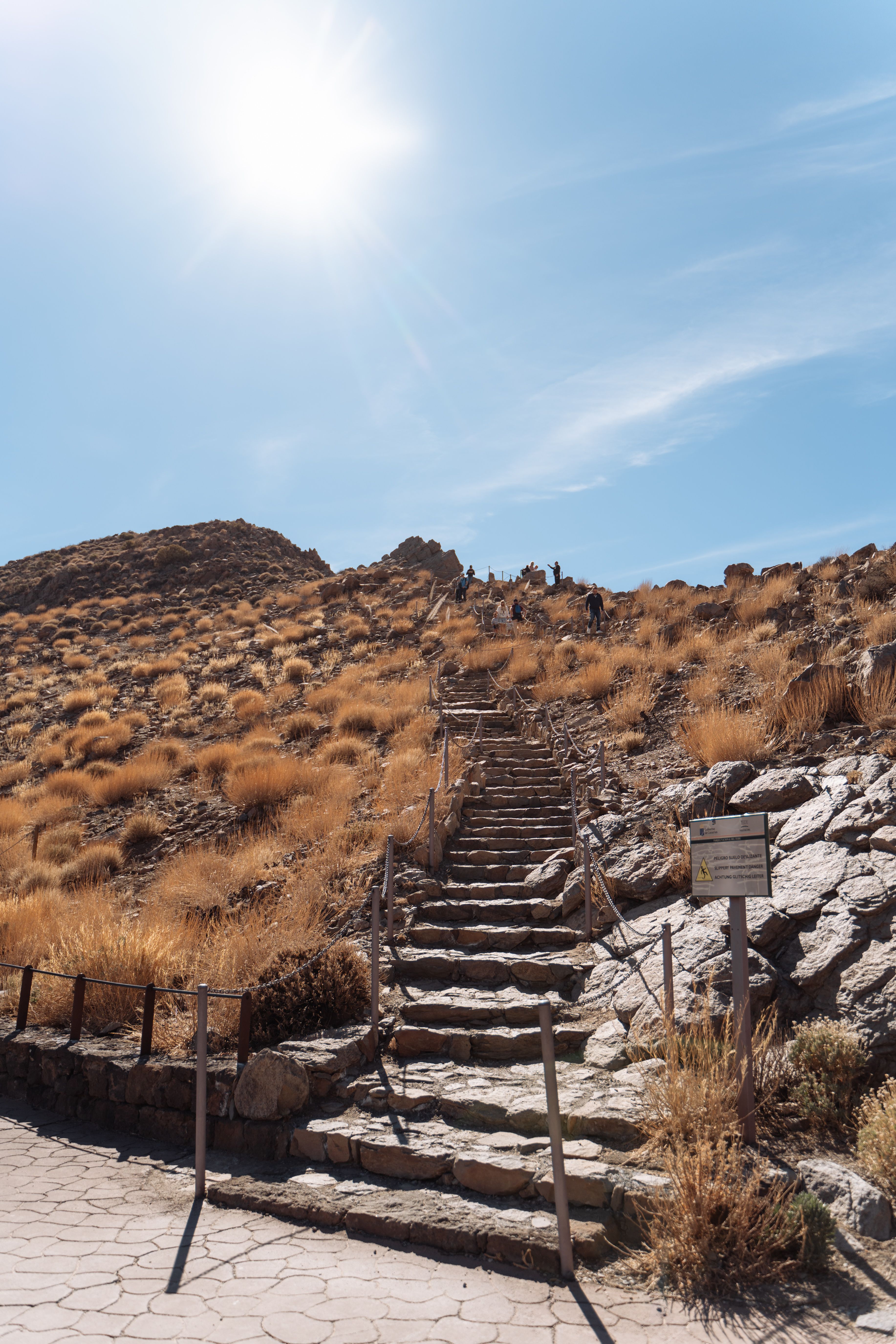 Rocky Pathway in Sunlit Desert Landscape · Free Stock Photo