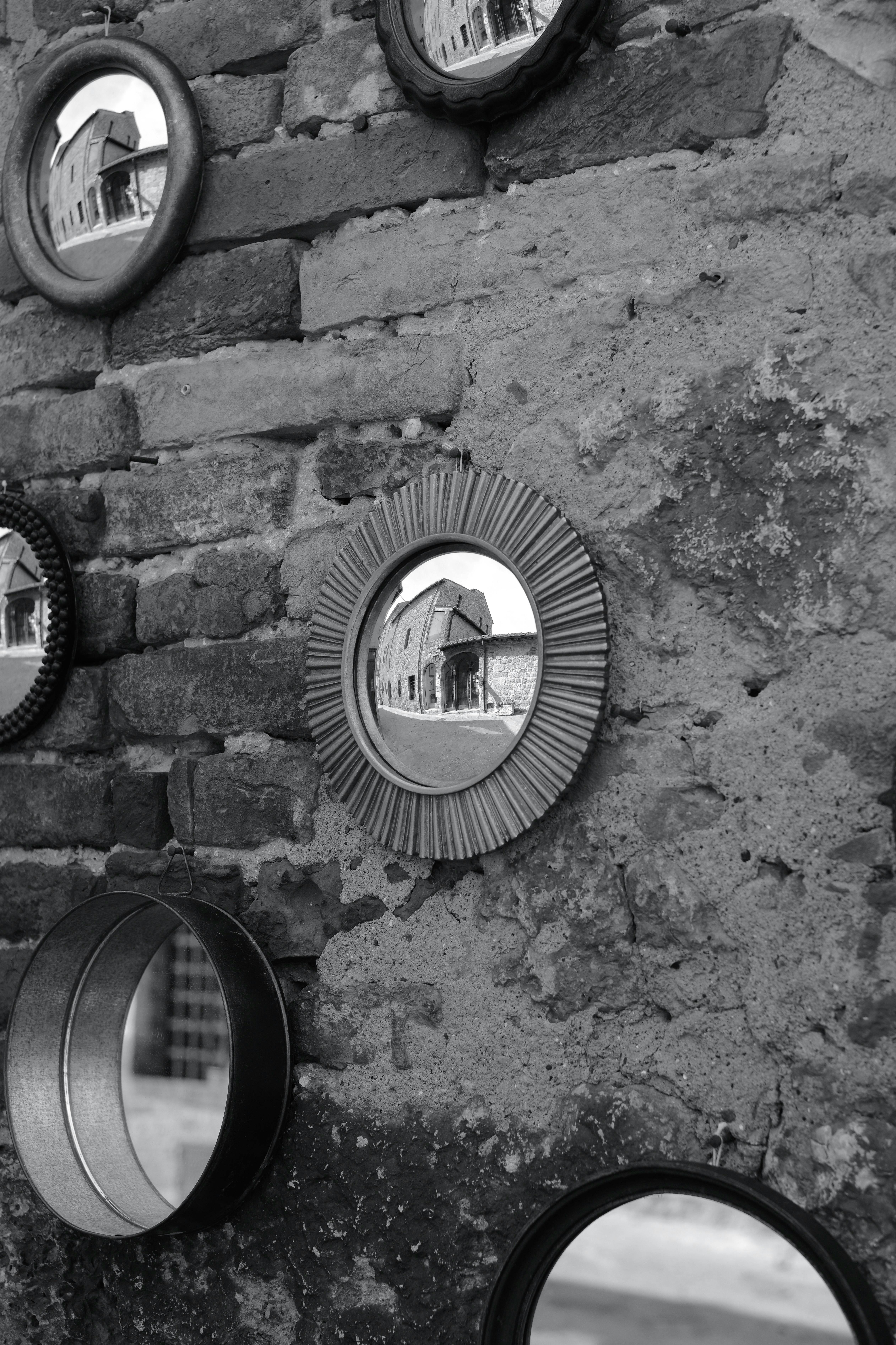 Reflections on Brick Wall with Mirrors · Free Stock Photo