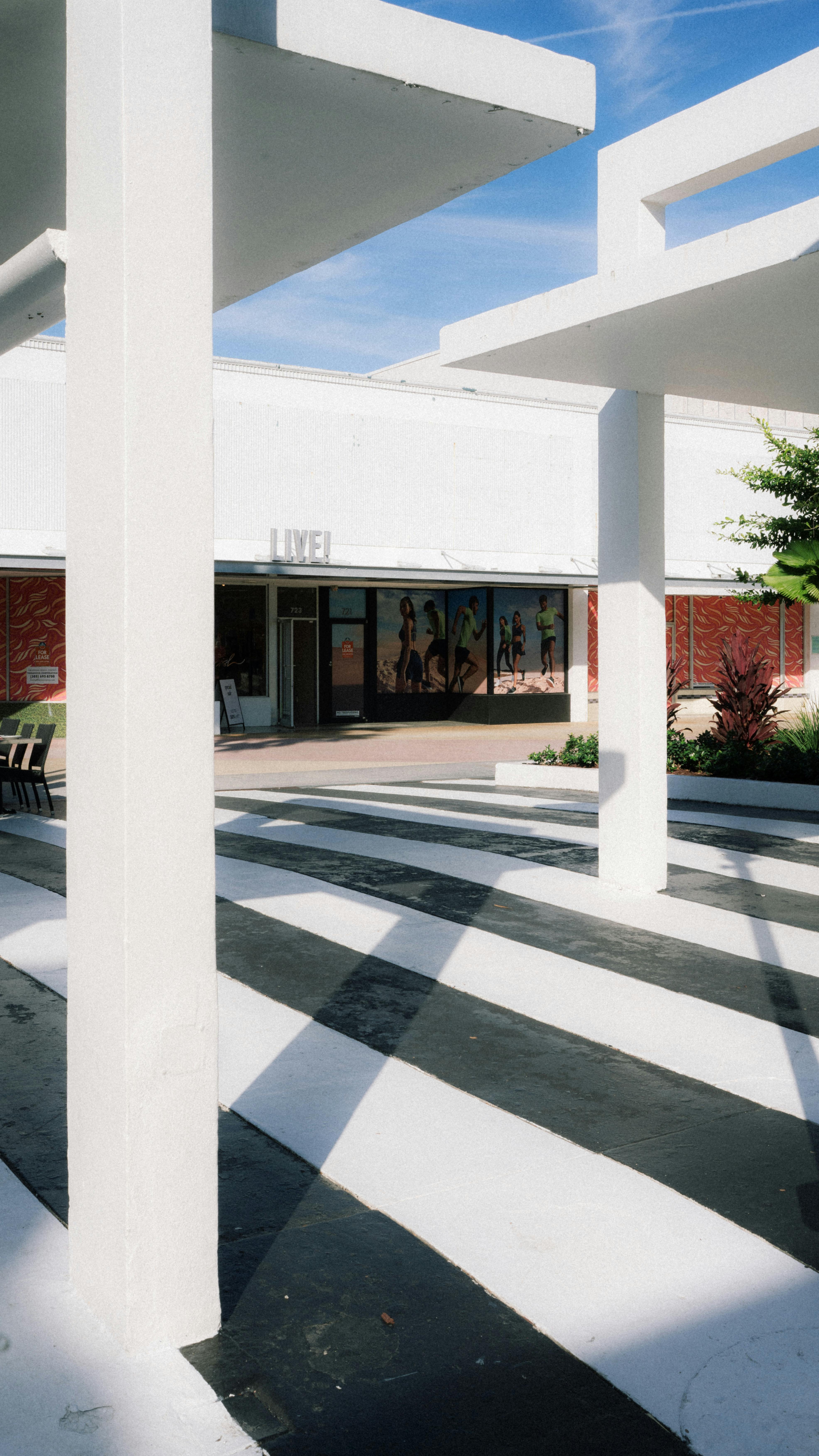 Modern Architecture with Bold Stripes and Shadows · Free Stock Photo