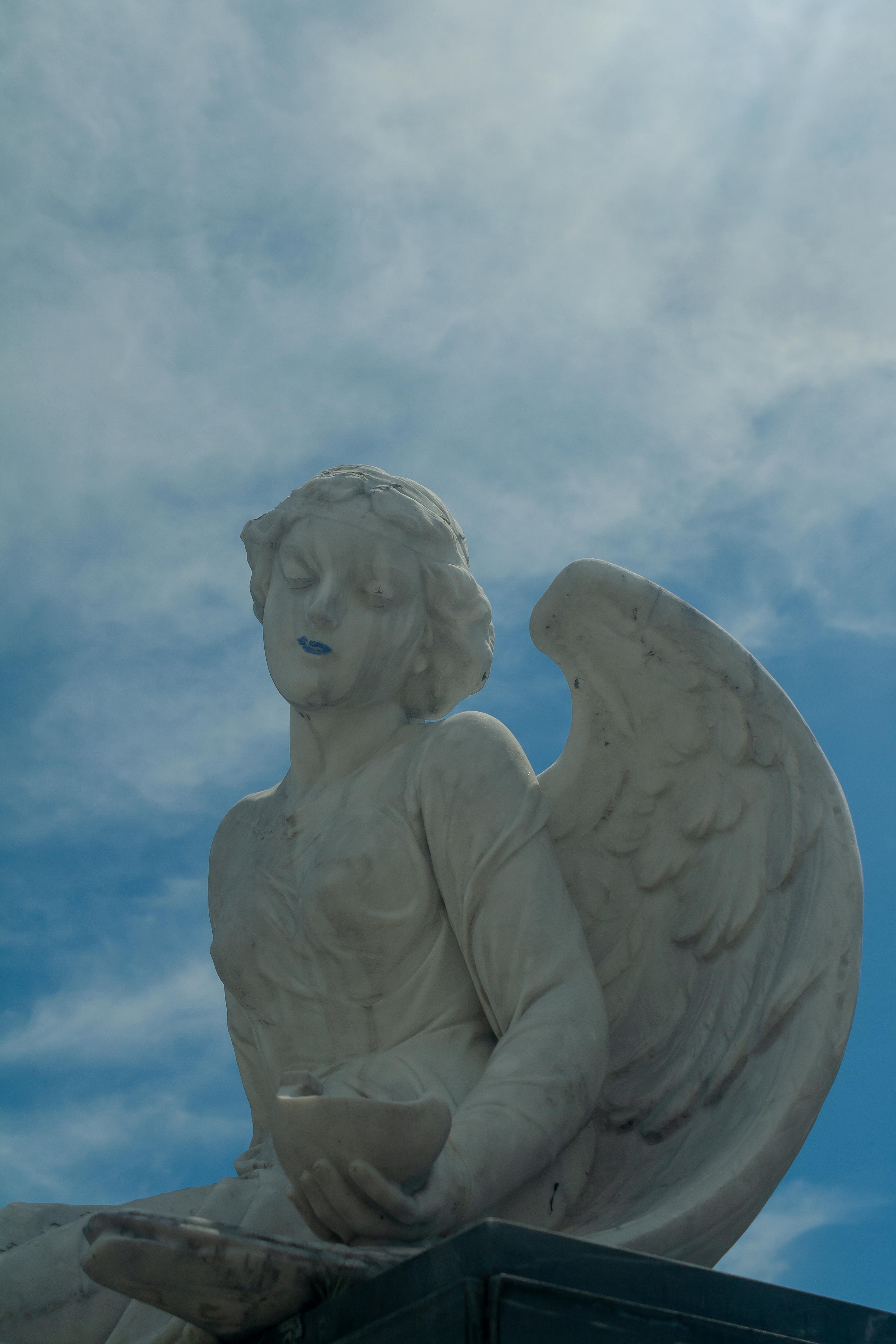 Angel Statue Against Blue Sky in Mérida · Free Stock Photo