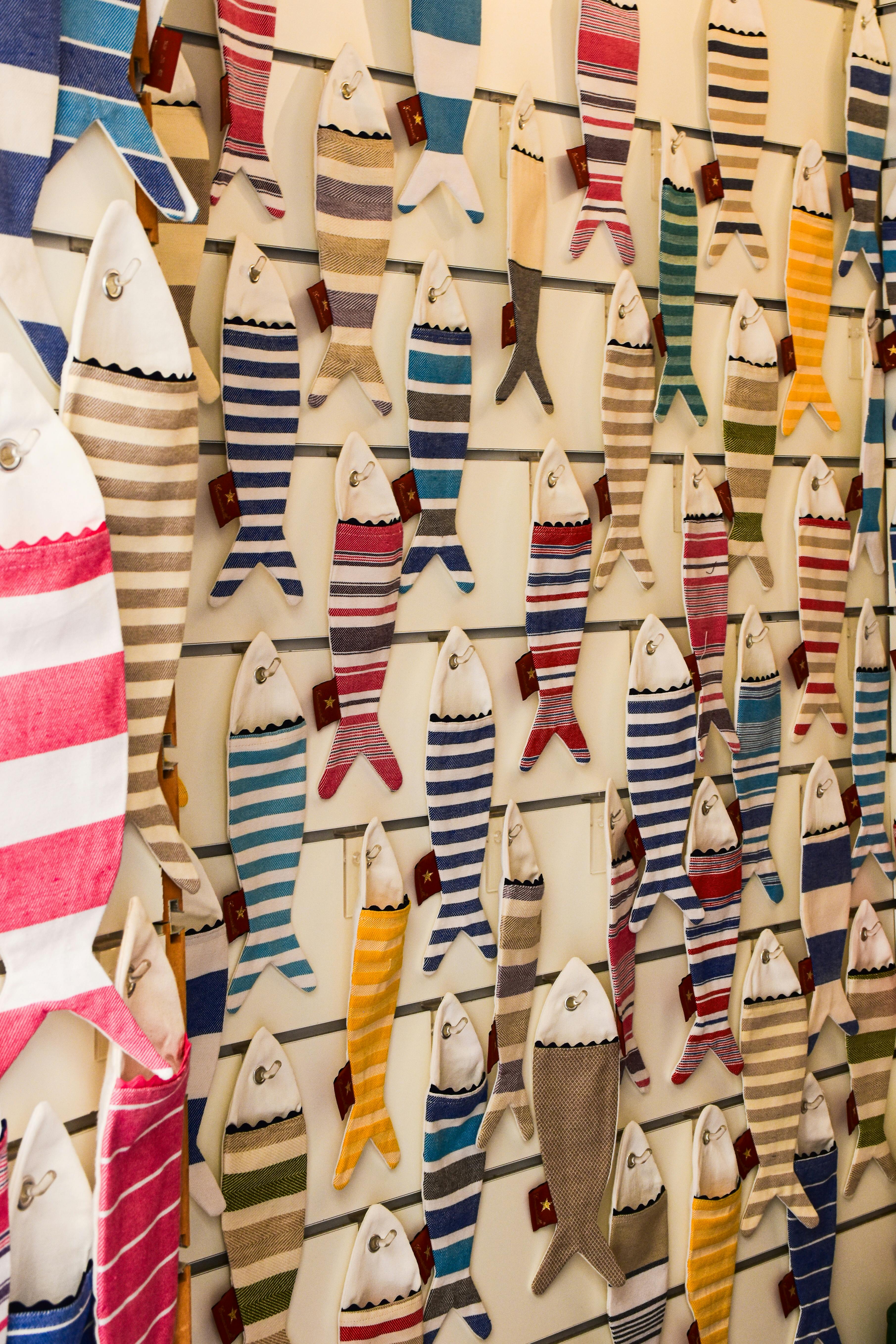Colorful textile fishes on display in Italy · Free Stock Photo