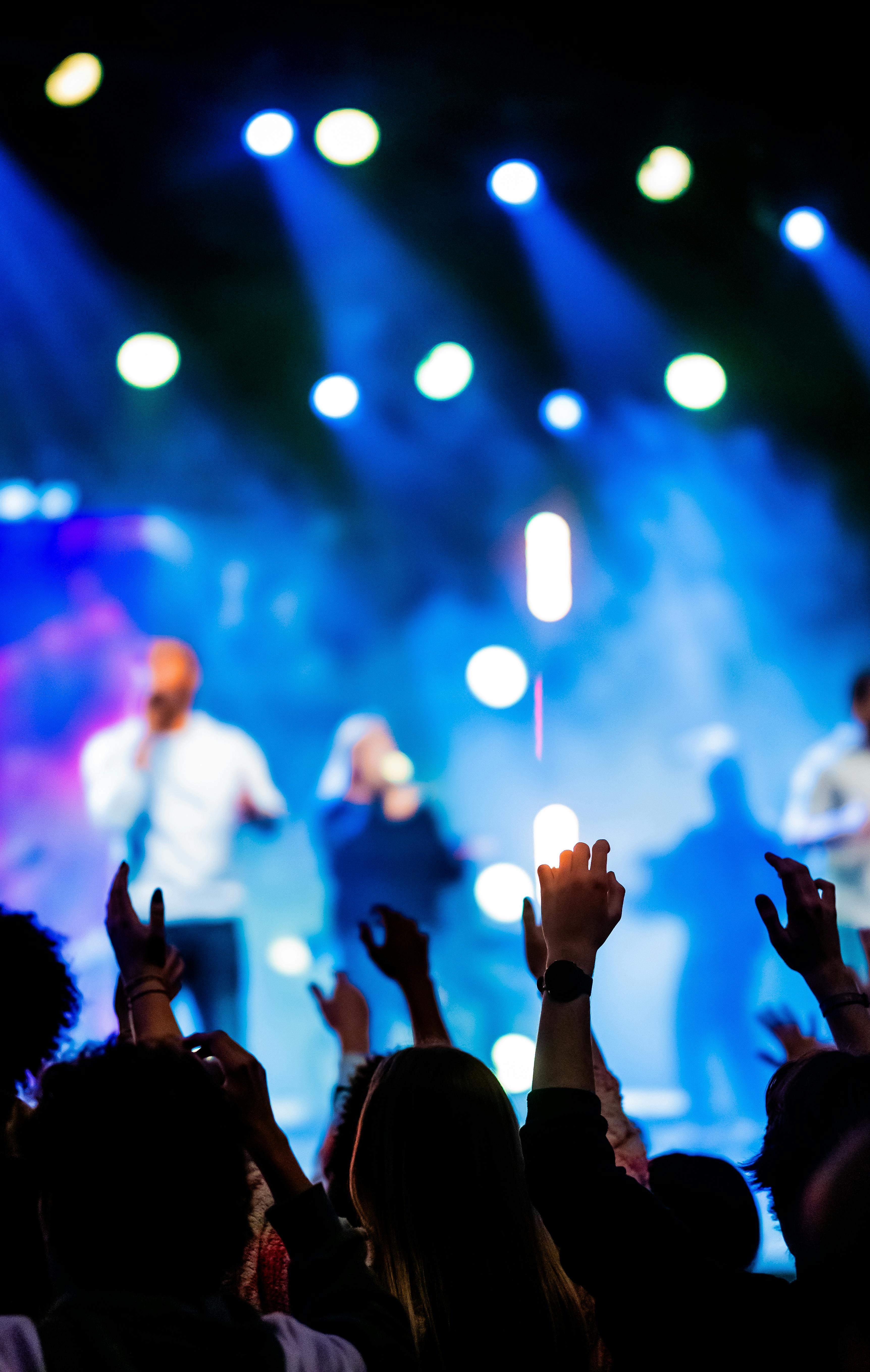 People Gathering Near Stage With Fireworks · Free Stock Photo