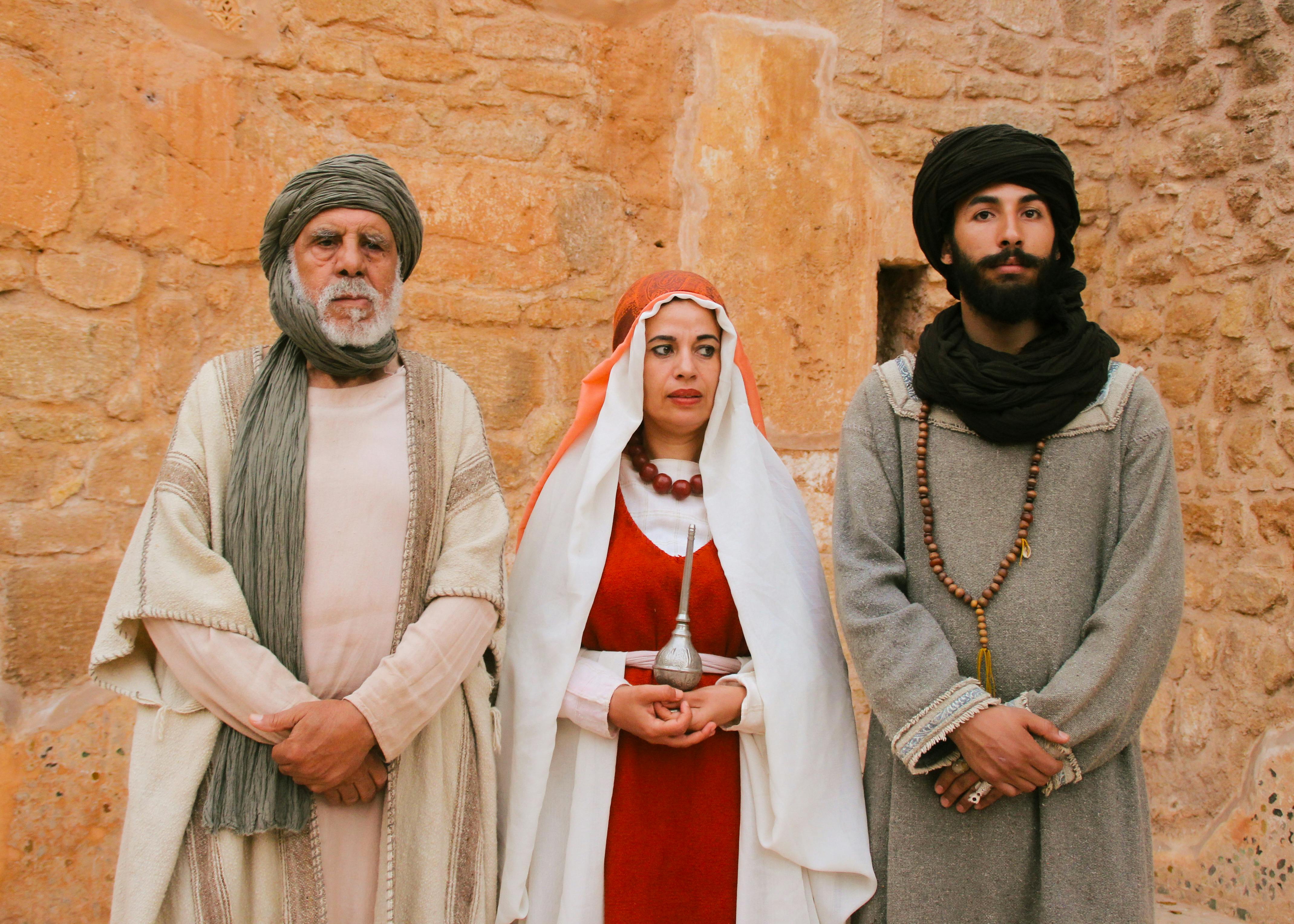 Traditional Moroccan Attire in Historic Setting · Free Stock Photo