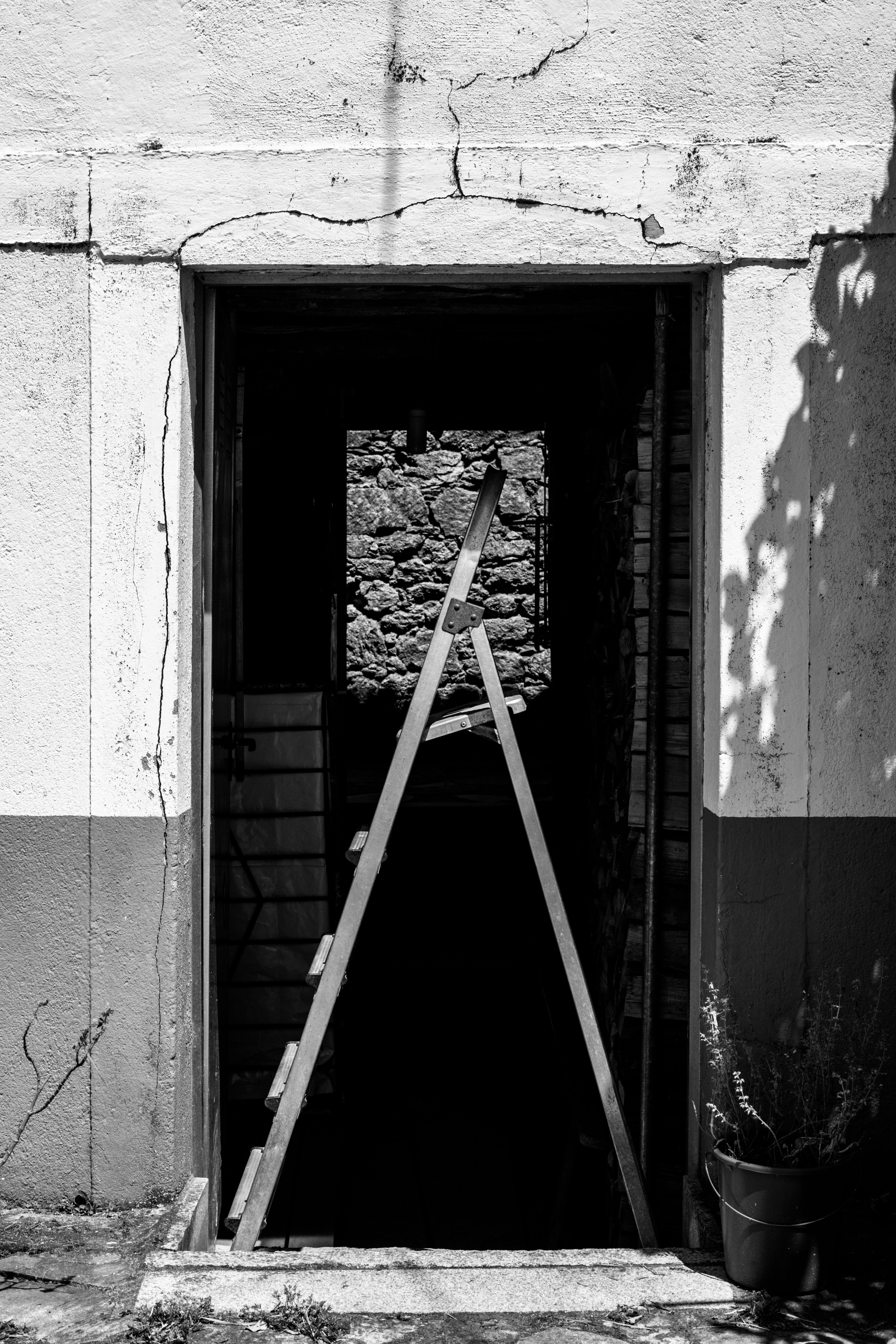 Black and White Rustic Ladder in Spanish Doorway · Free Stock Photo