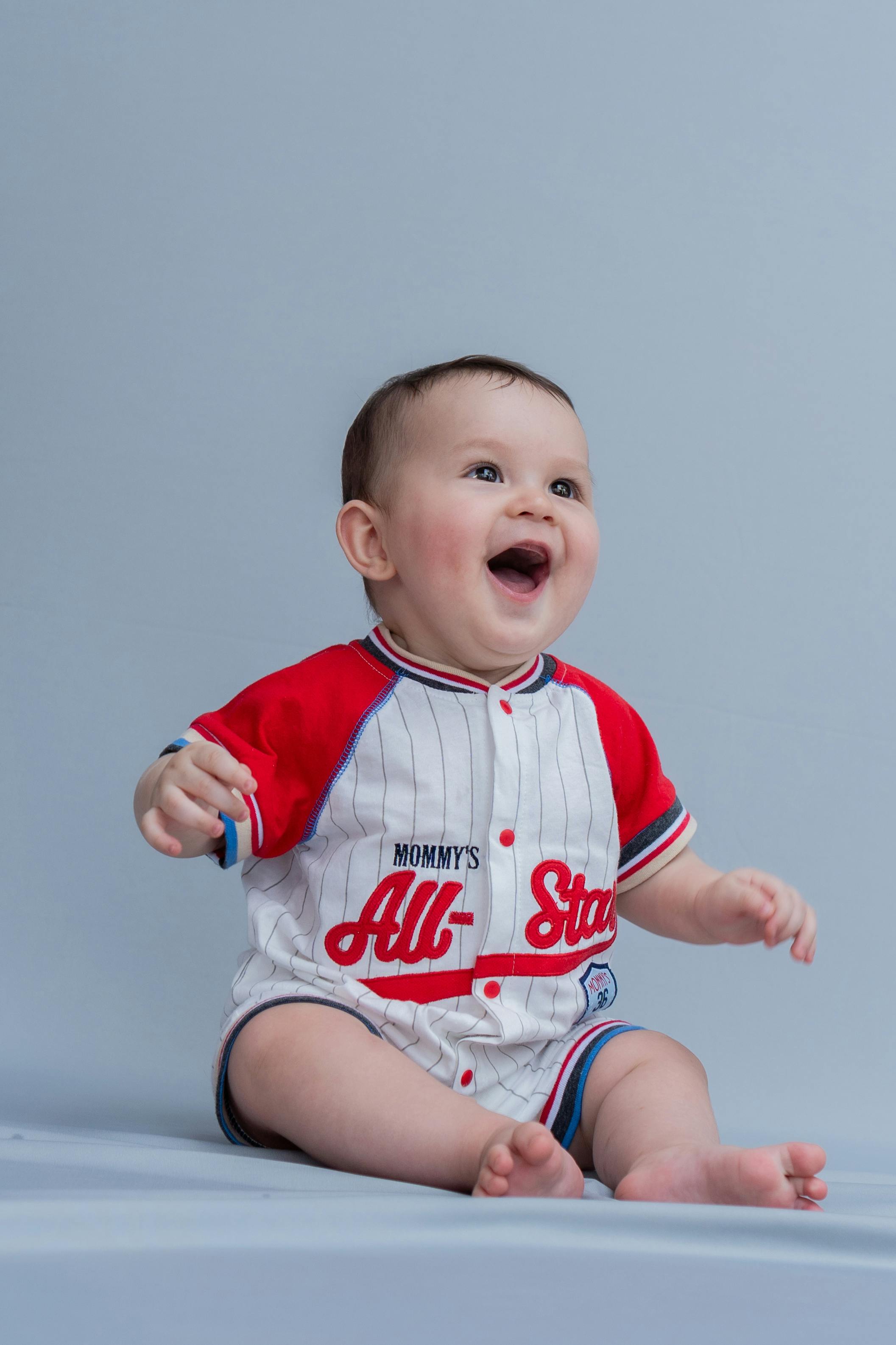 Adorable Baby in All-Star Baseball Outfit · Free Stock Photo