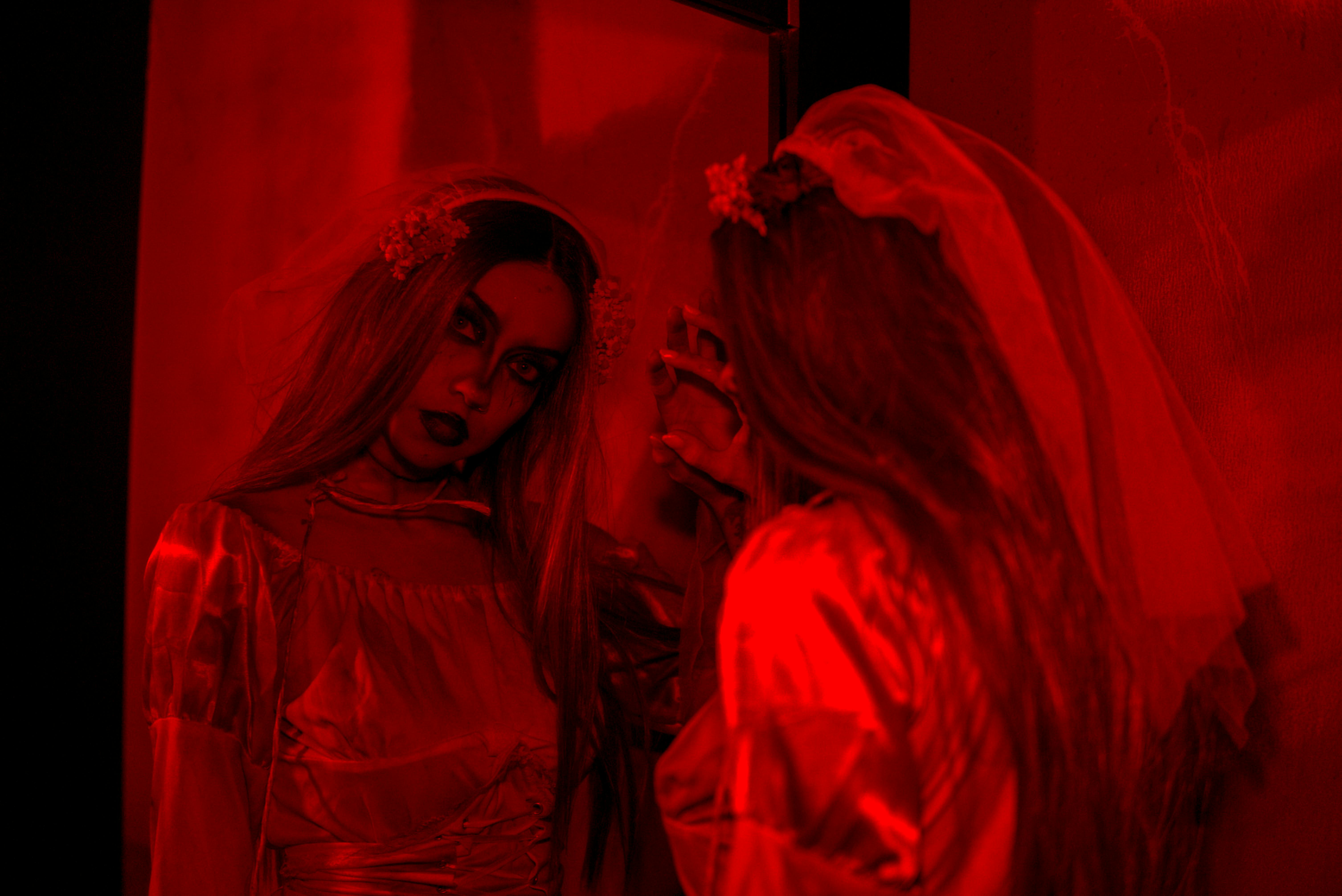 Haunted Bride in Dramatic Red Lighting · Free Stock Photo