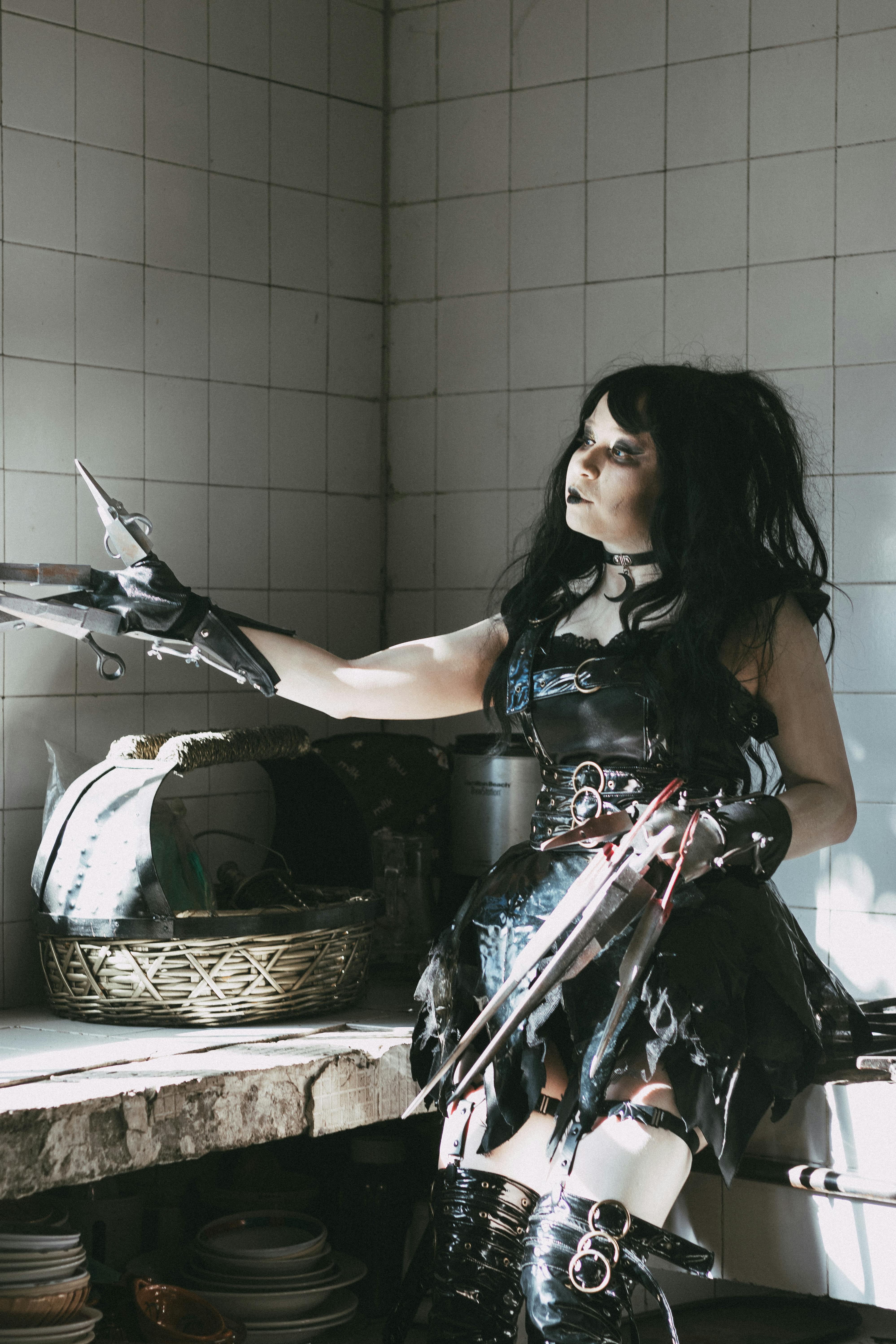 Gothic Cosplay in Dimly Lit Kitchen · Free Stock Photo