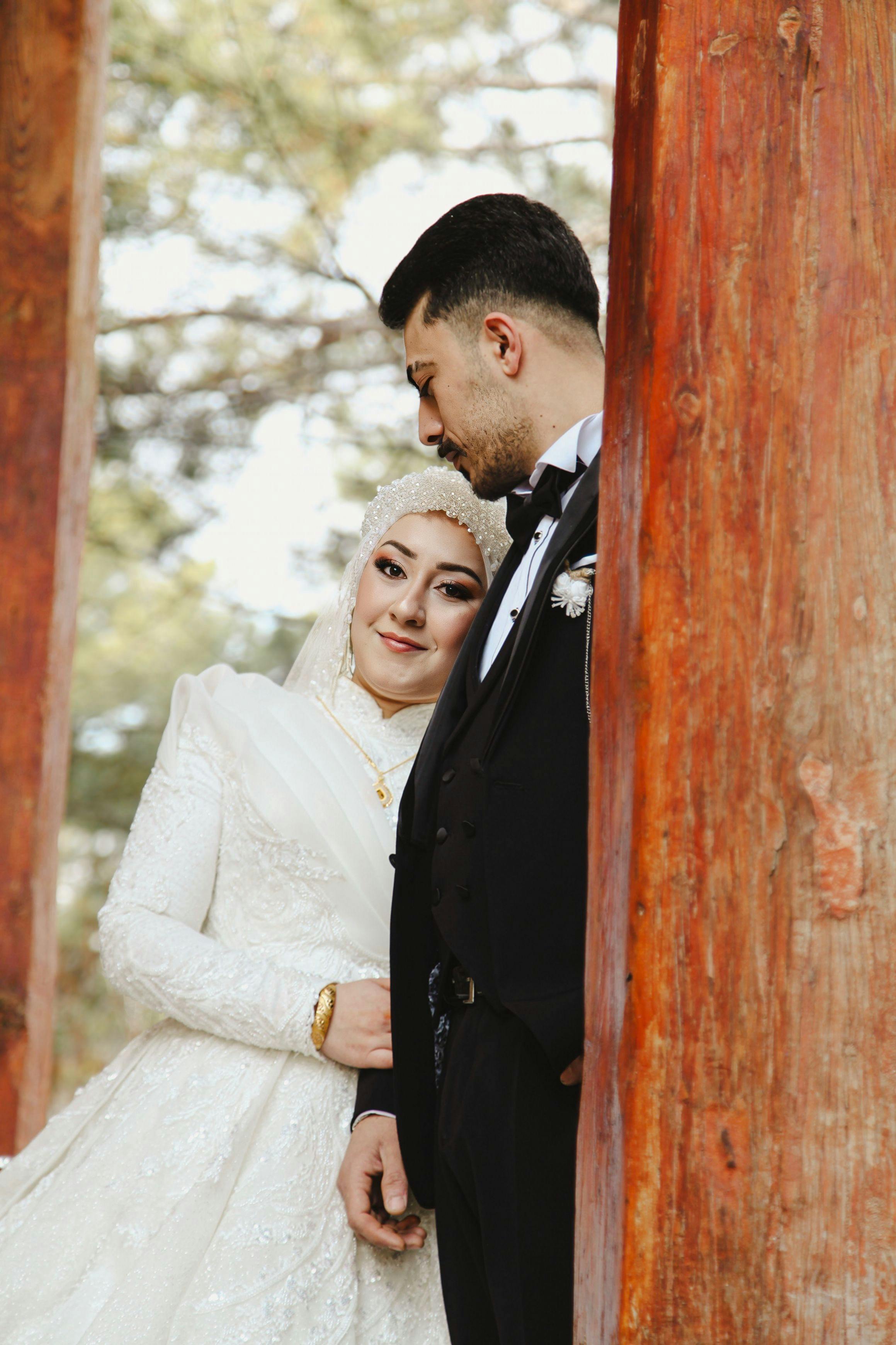 Beautiful outdoor wedding portrait with couple · Free Stock Photo