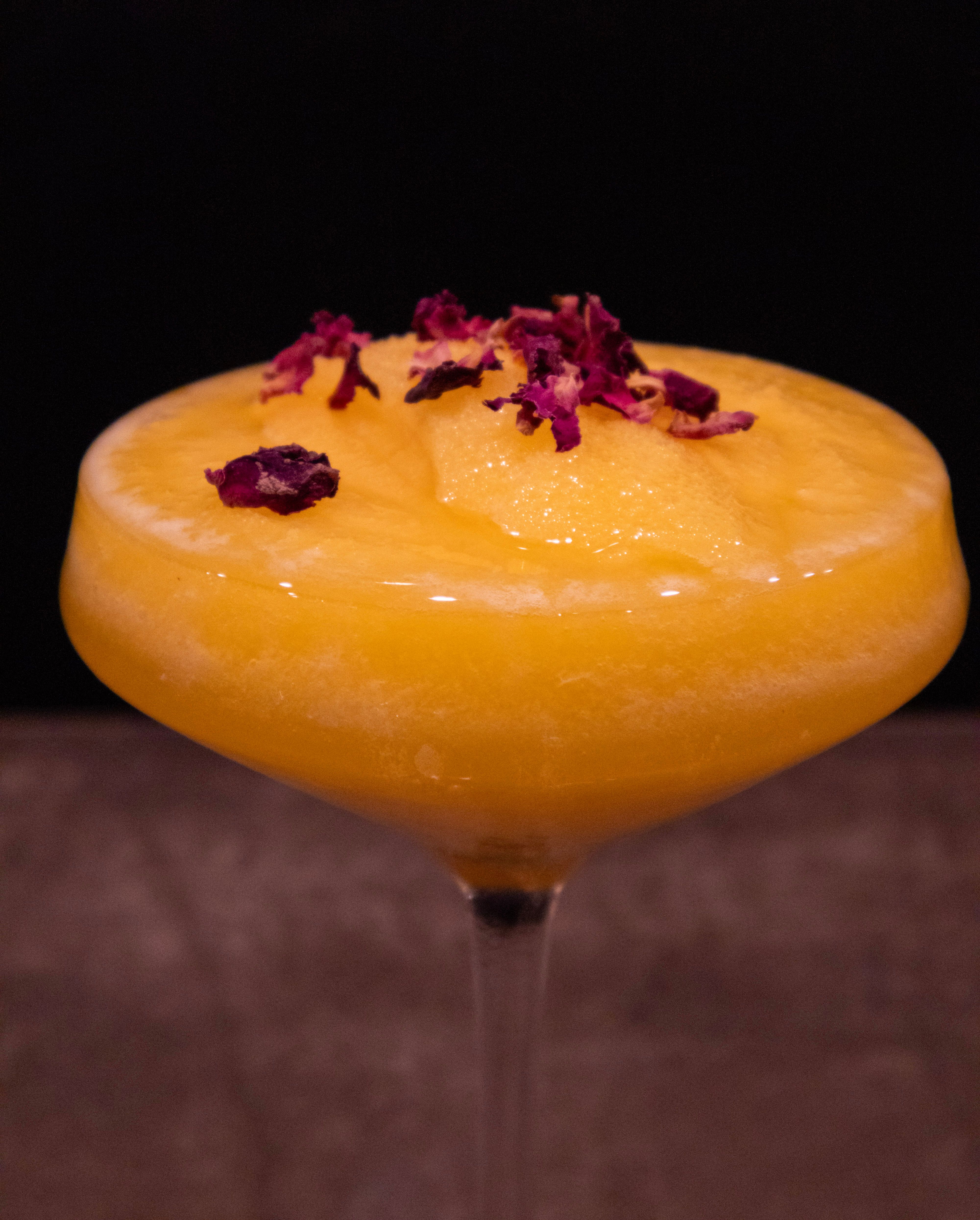 Tropical Mango Daiquiri with Floral Garnish · Free Stock Photo