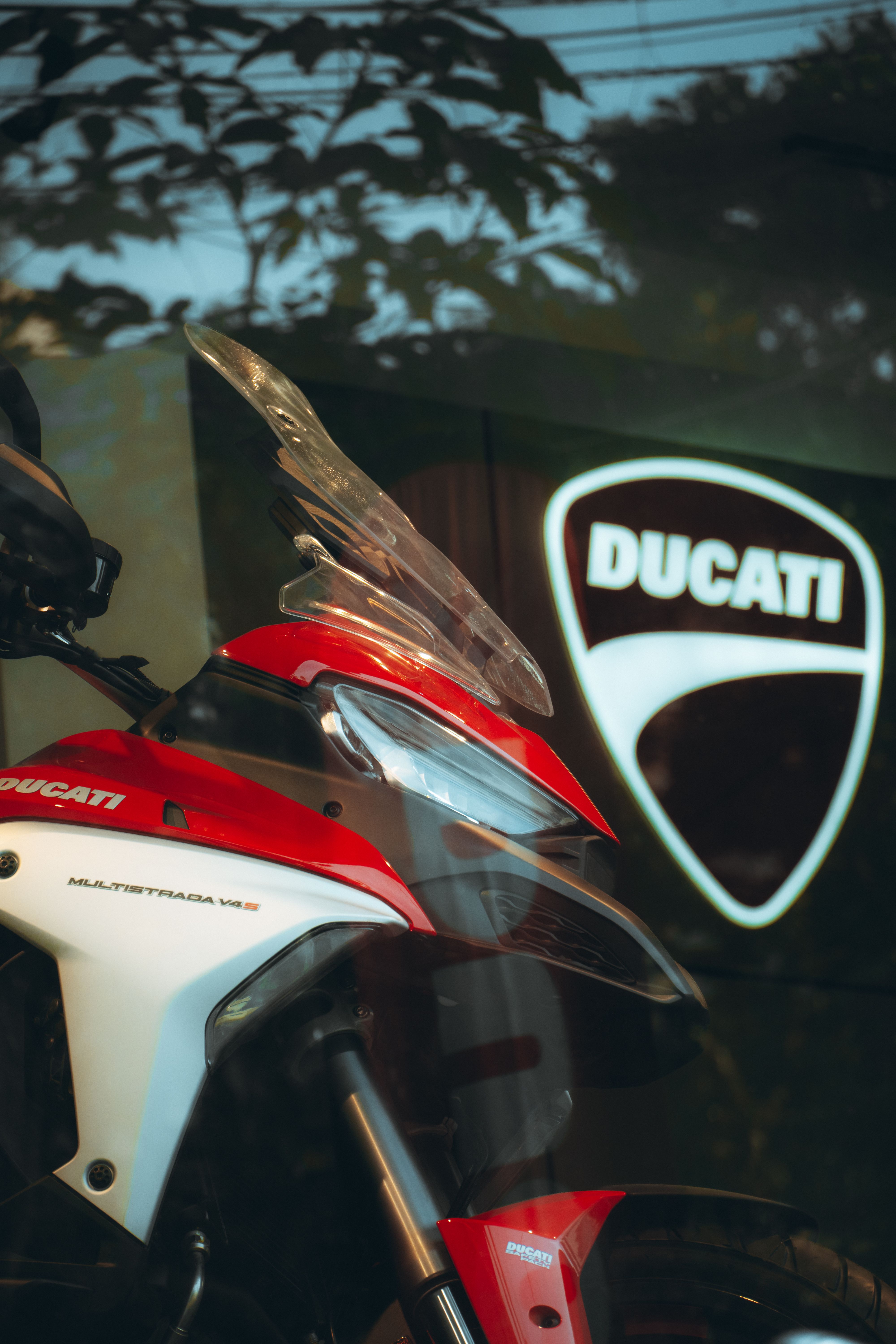 Ducati Motorcycle Display in Modern Showroom · Free Stock Photo