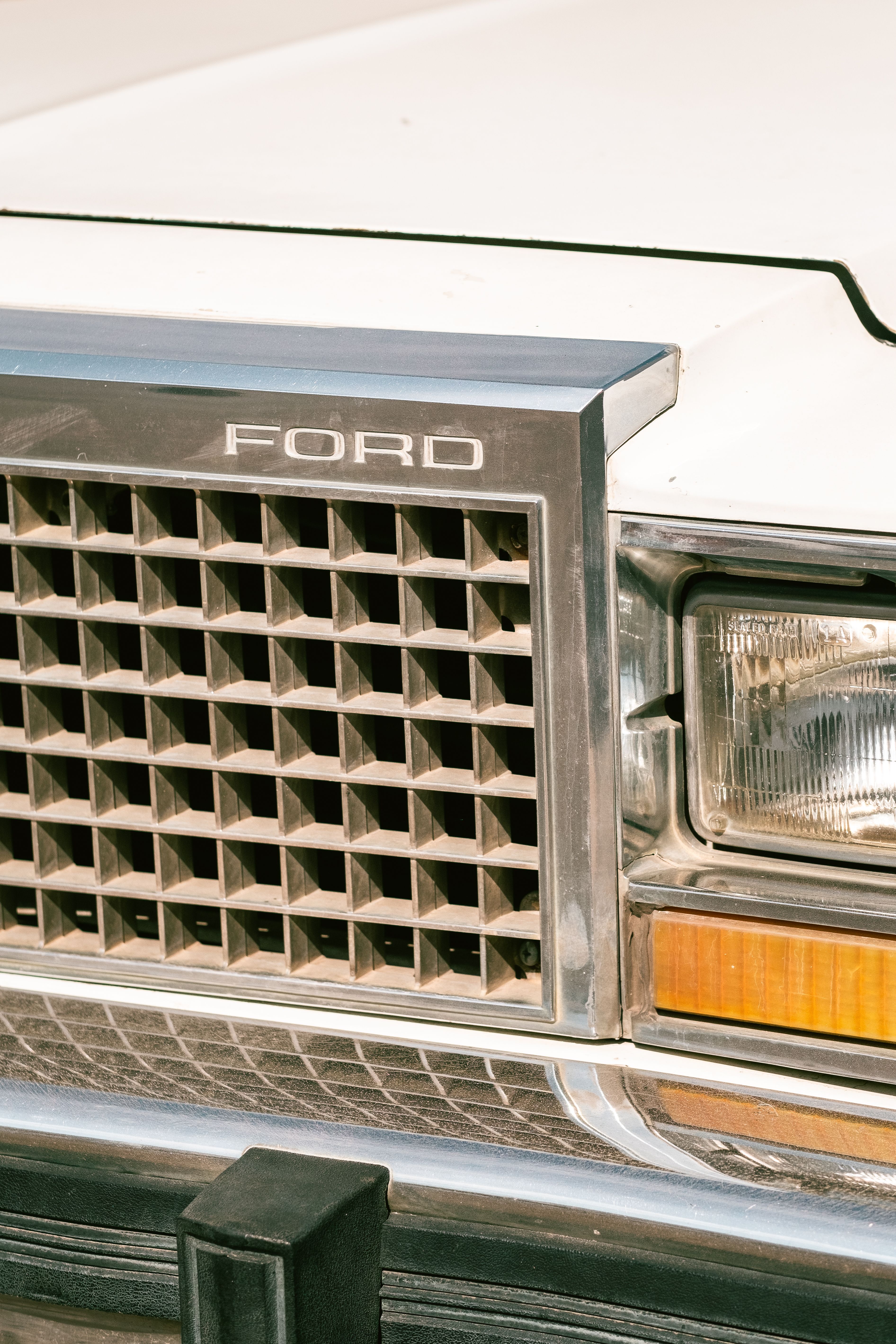 Close-up of Vintage Ford Car Grille · Free Stock Photo