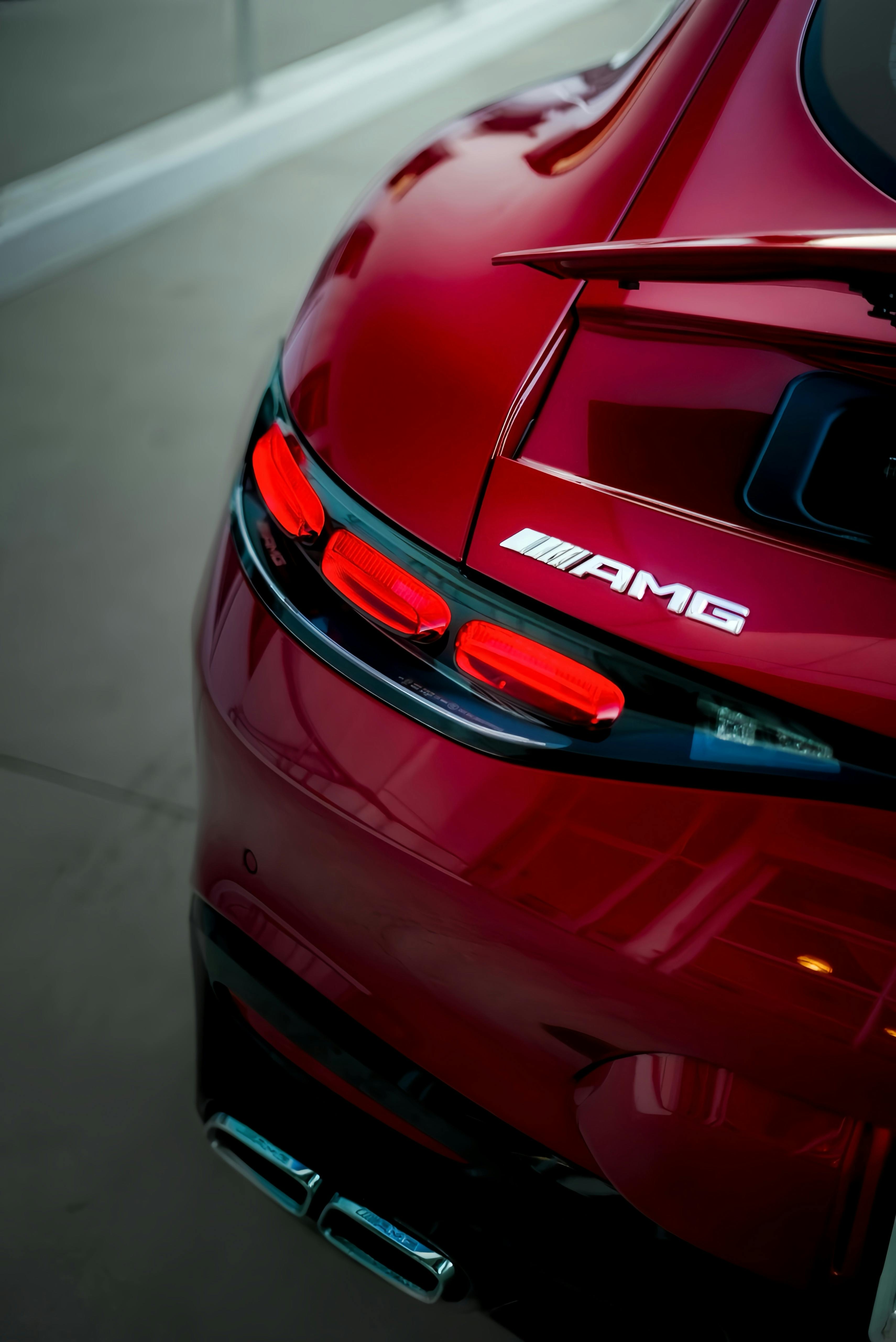 Red Luxury Sports Car Rear View Design · Free Stock Photo