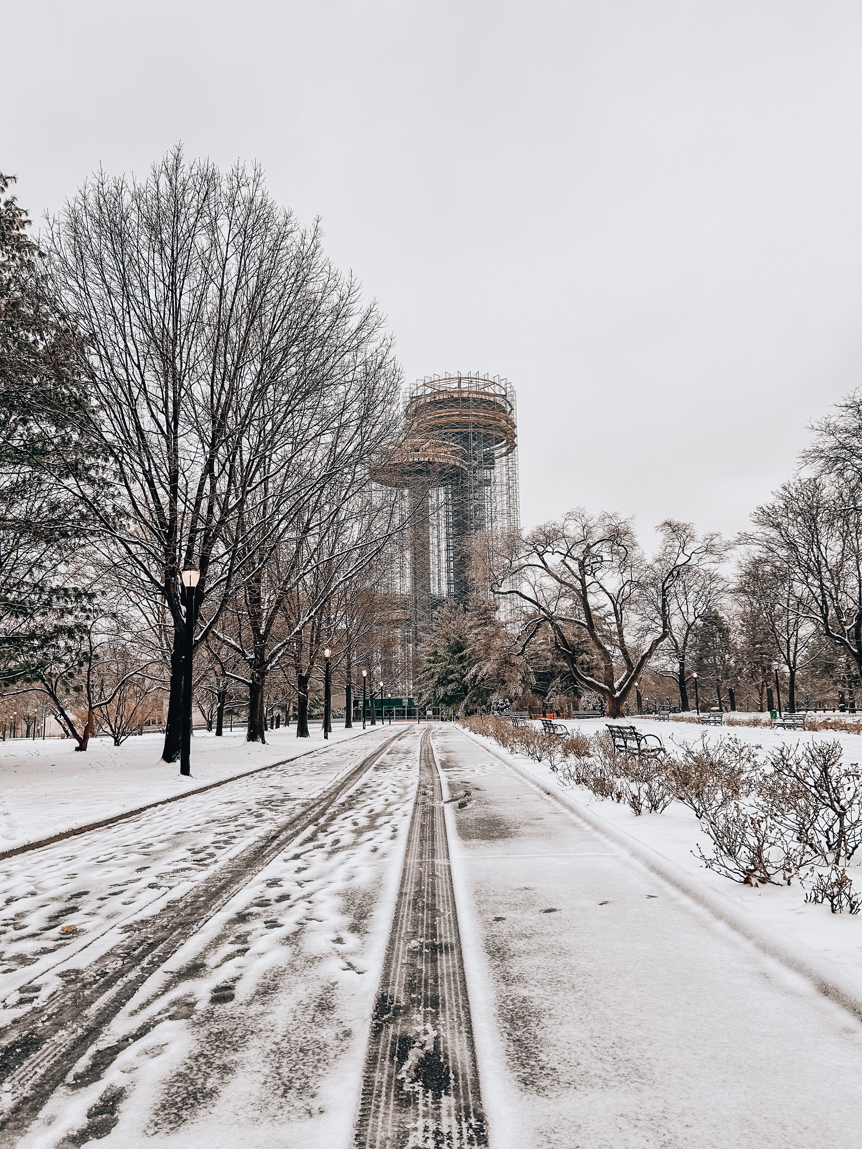 Winter view of New York State Pavilion in snow · Free Stock Photo