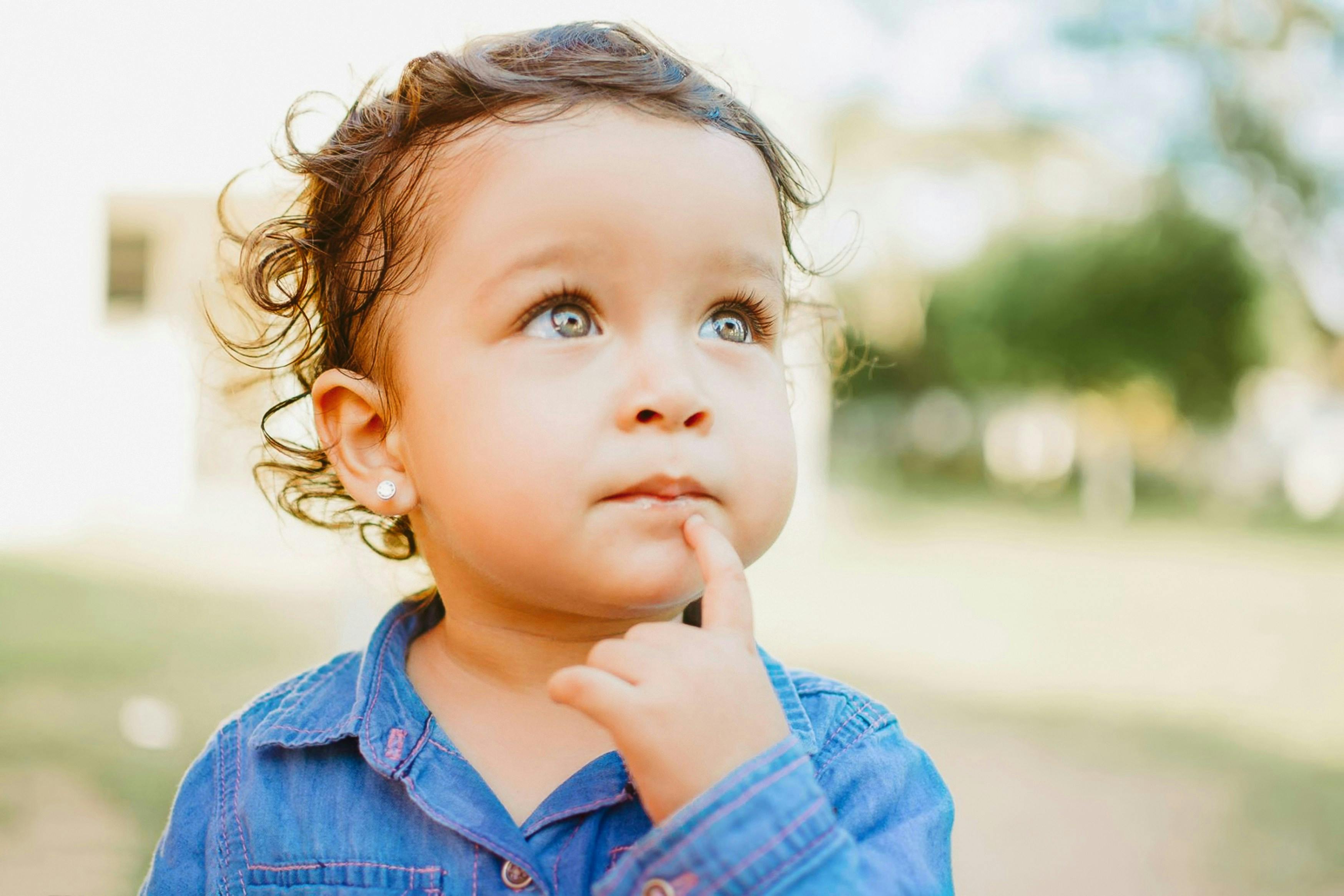 Thoughtful Baby Outdoors in Martínez, Mexico · Free Stock Photo
