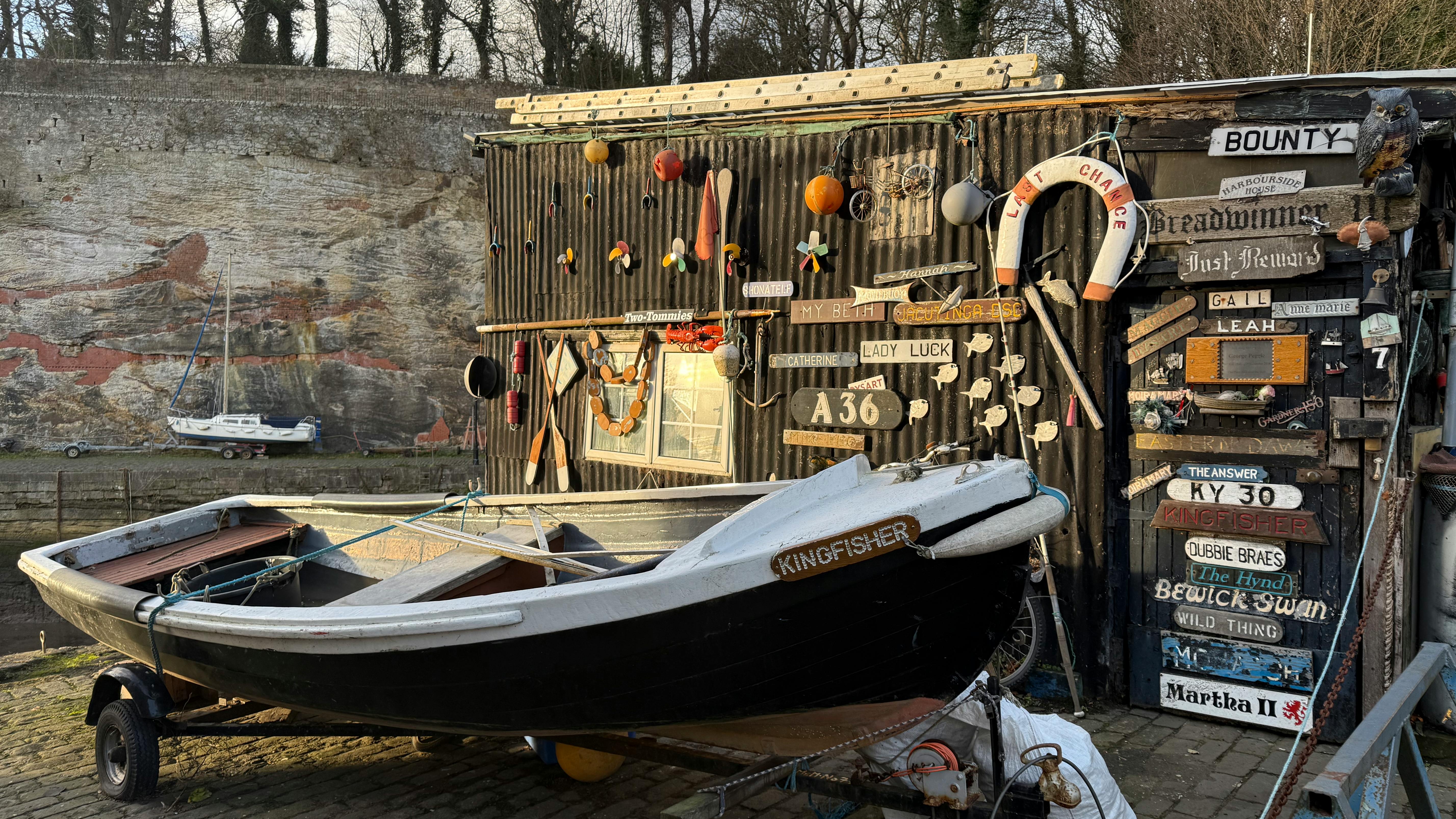 Rustic Boathouse with Rowboat Kingfisher at Sunset · Free Stock Photo